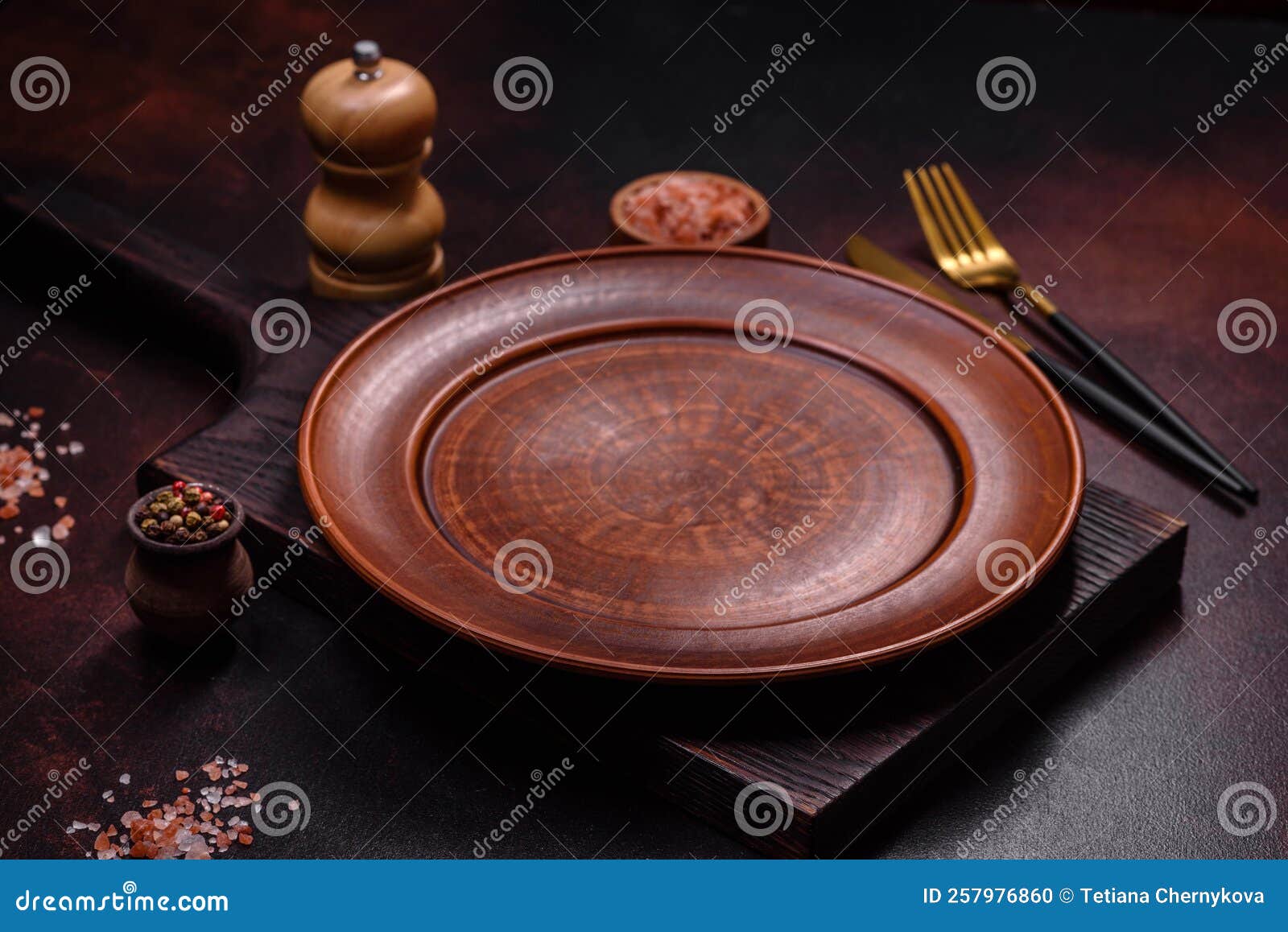 An Empty Brown Ceramic Plate on a Dark Concrete Brown Background Stock ...
