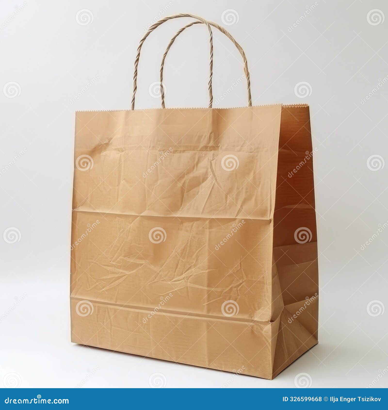 Empty Brown Craft Paper Bag with Folded Top on White Background, Lit by ...