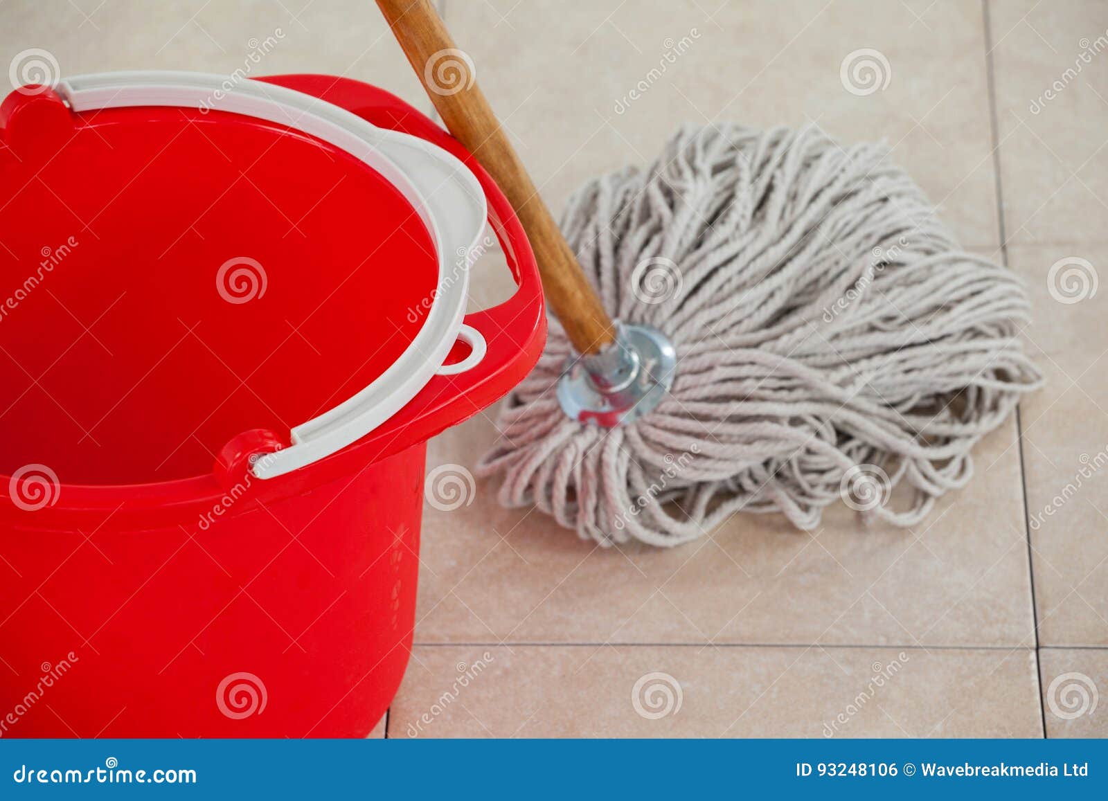 Empty Bucket and Mop on Tile Floor Stock Photo - Image of maintenance ...