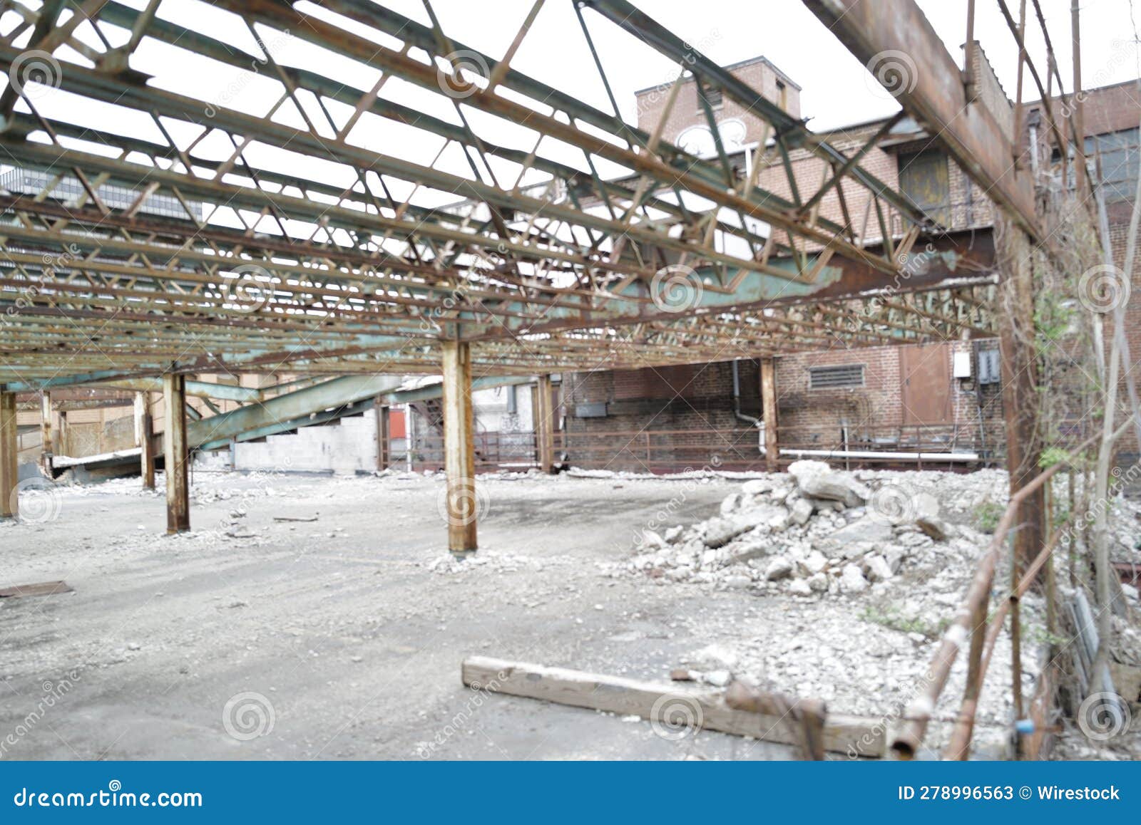 An Empty Building with Several Metal Structures and Rusty Beams ...