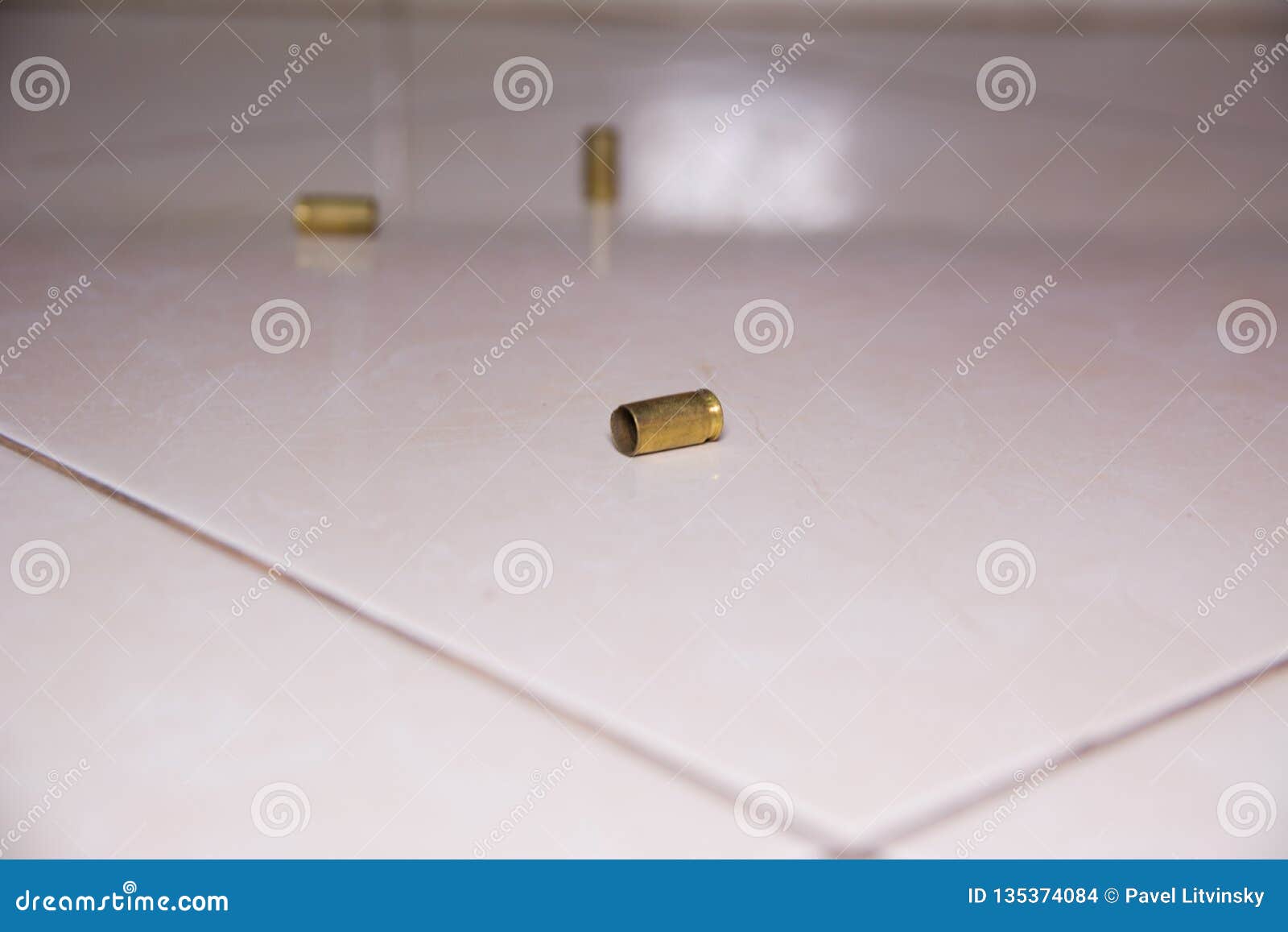 Empty Bullet Shells on the House Floor. Bullet Casings on the Ceramic ...