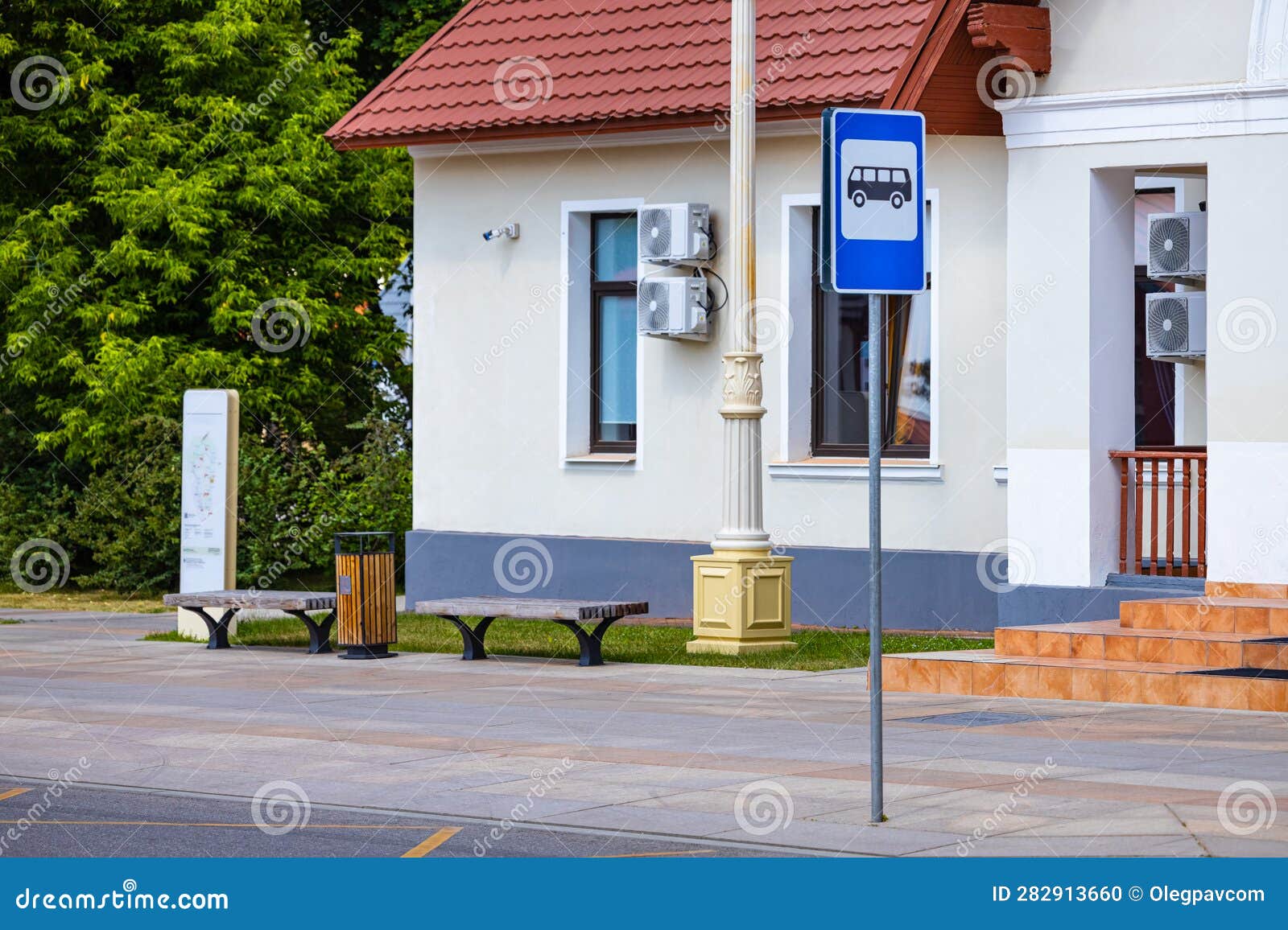 Empty Bus Stop in a Small Town Stock Photo - Image of rules, road ...