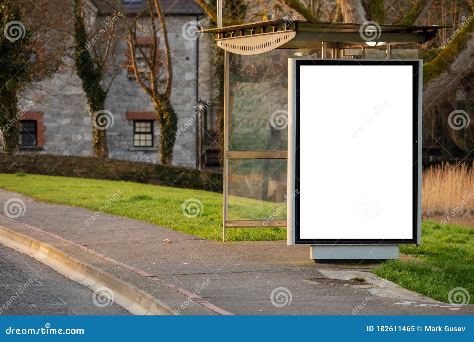 Empty Bus Stop in Town with Blank Mock Up Vertical Billboard for ...
