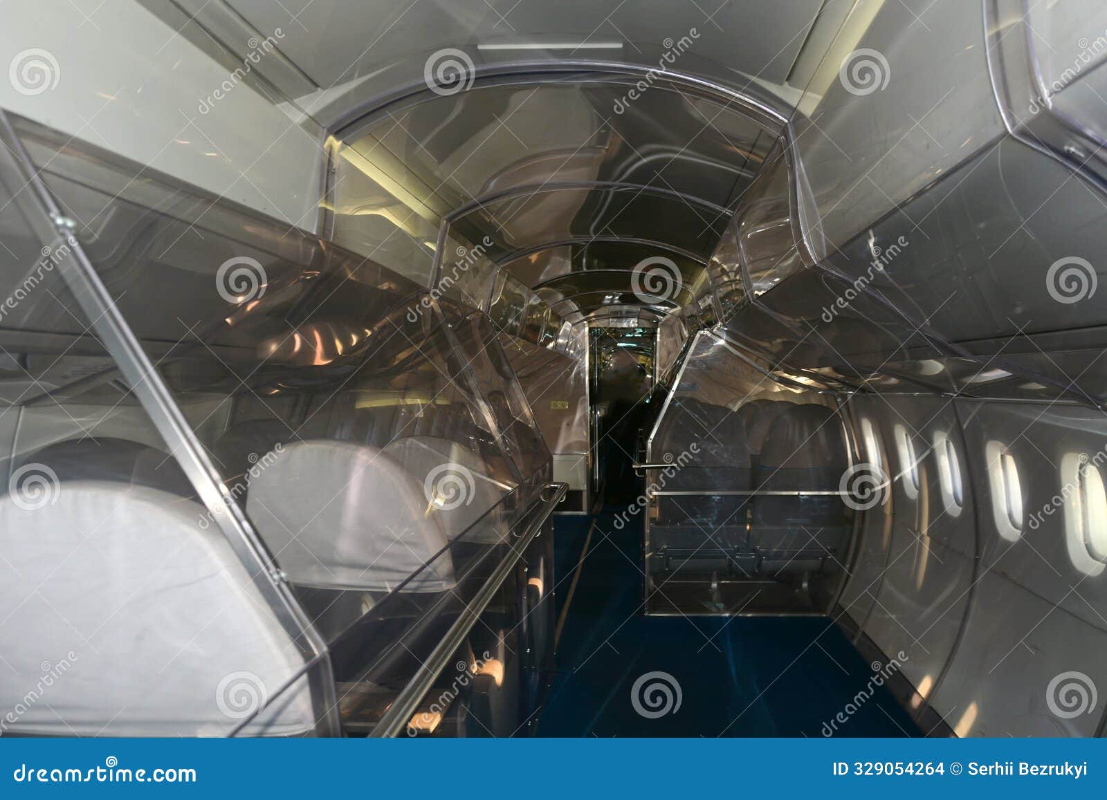 Empty Cabin of a Passenger Plane from the Inside with Rows of Seats in ...