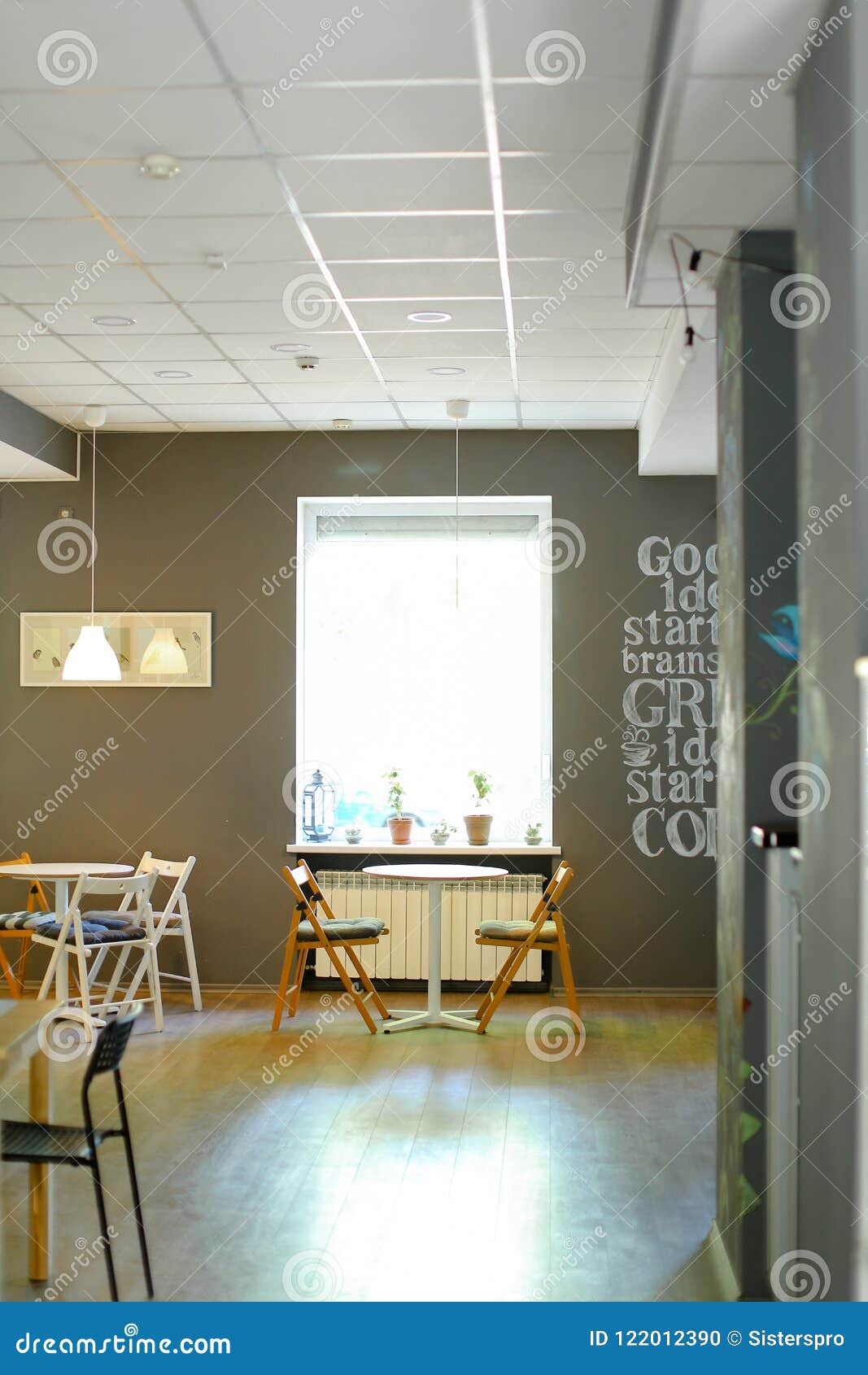 Empty Cafe Interior with Grey Walls and Inscriptions on it. Stock Photo ...