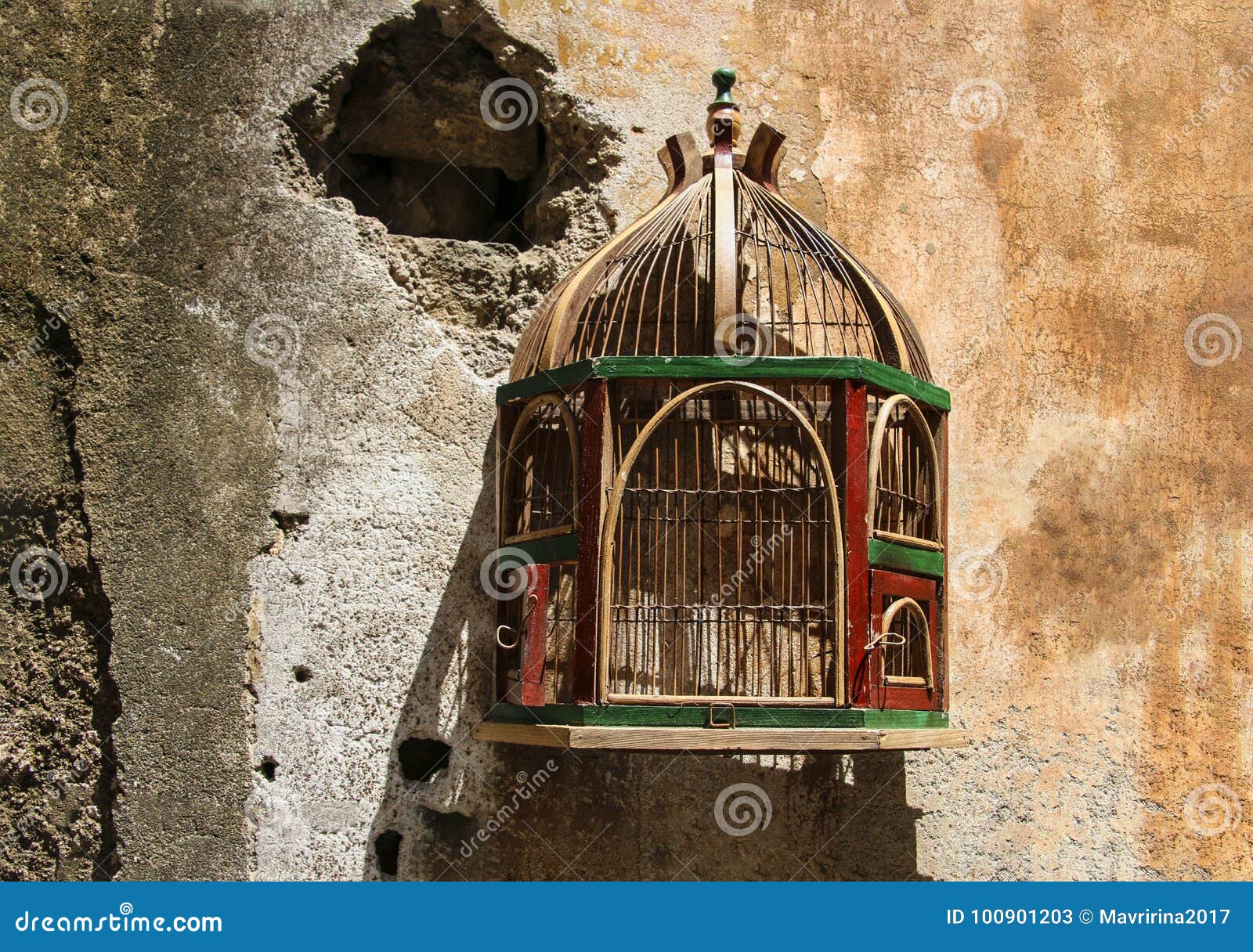 Empty Cage for Birds on an Old, Shattered Wall Stock Image - Image of ...