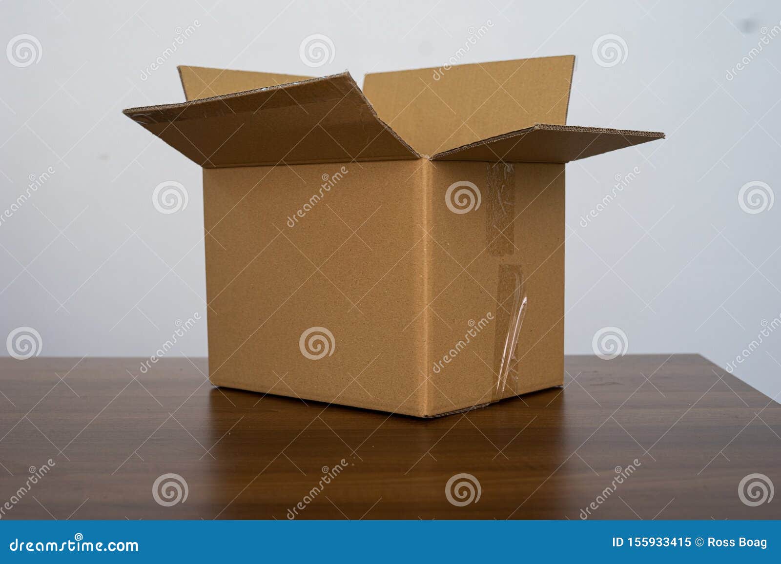 Empty Card Board Box on Table Stock Image - Image of cardboard, table ...
