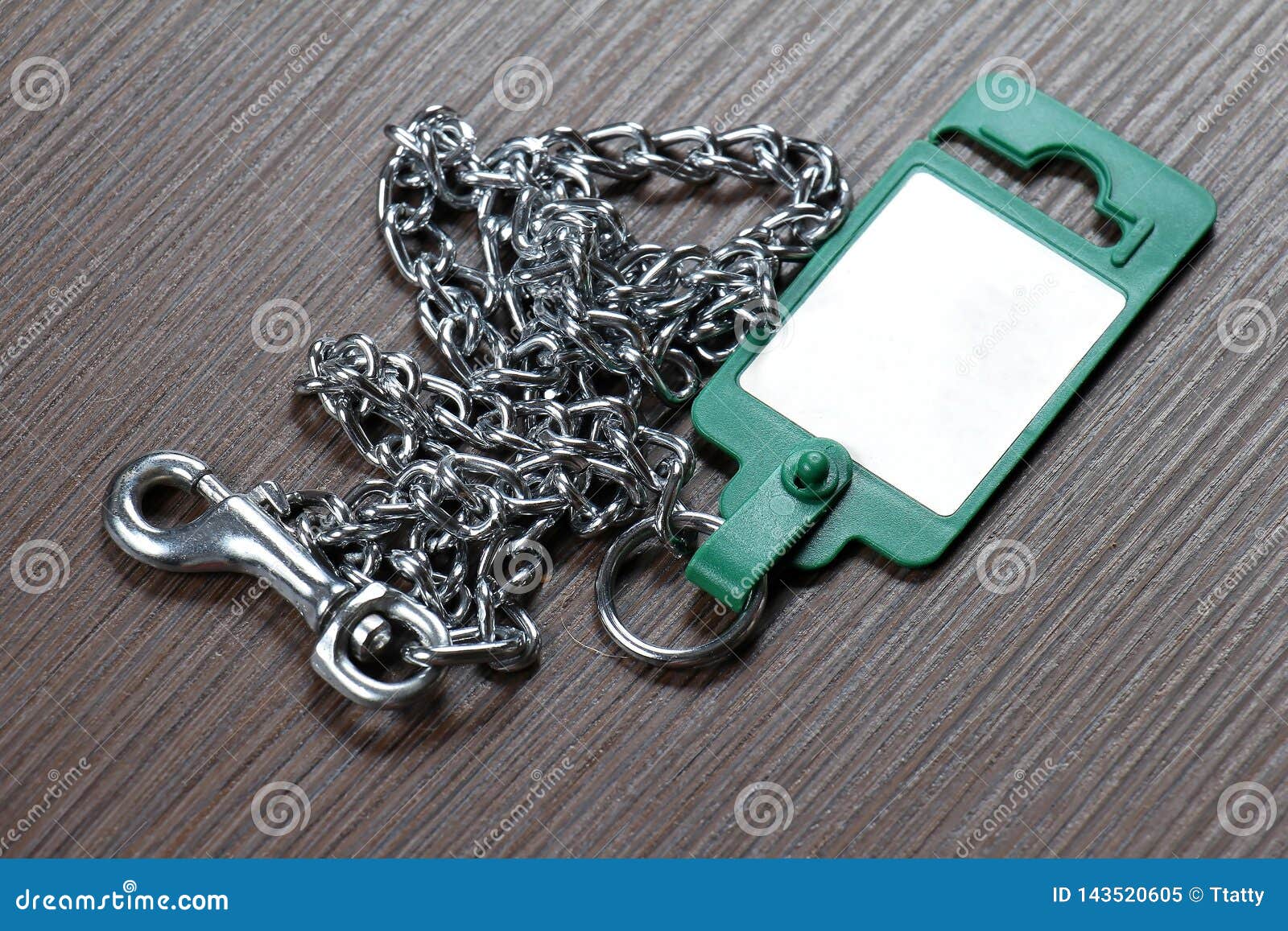 Empty card on metal chain stock image. Image of background - 143520605