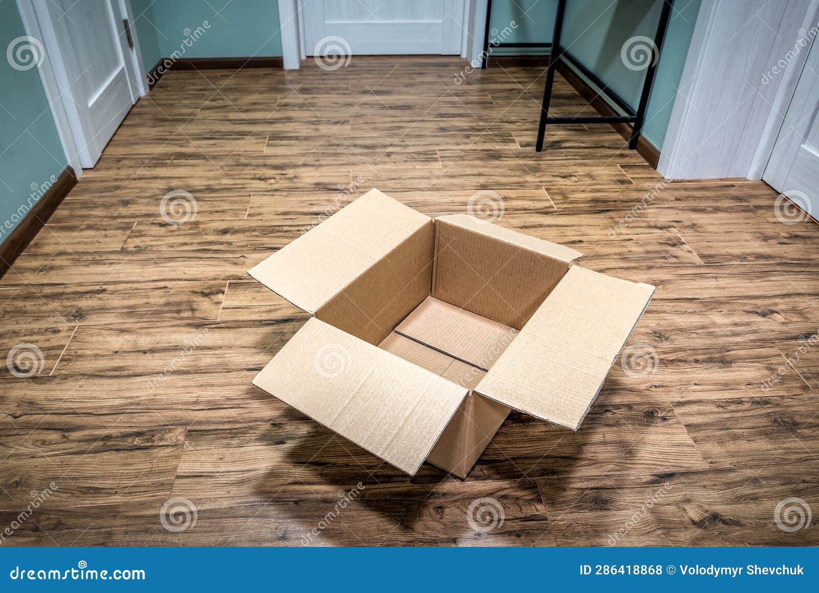 Empty Cardboard Box on Tilled Floor Stock Photo - Image of office ...