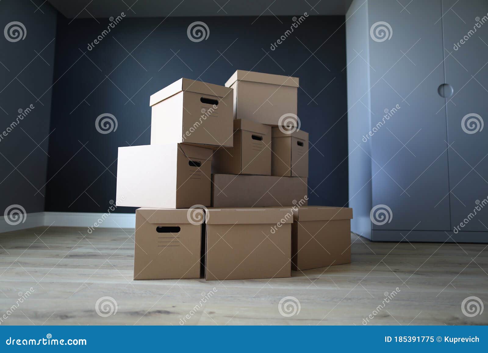Empty Cardboard Boxes Stand in an Empty Room Stock Image - Image of ...