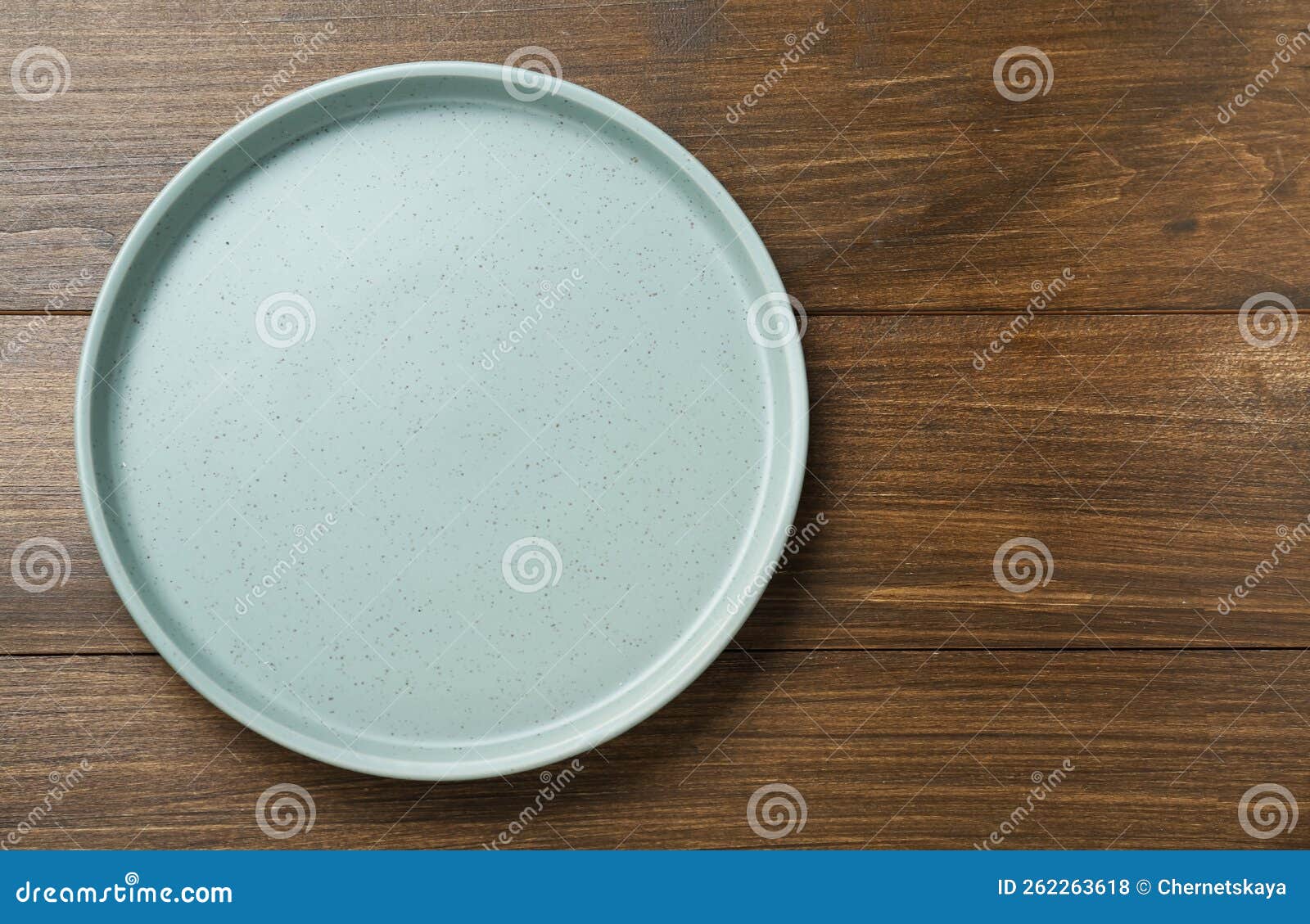 Empty Ceramic Plate on Wooden Table, Top View. Space for Text Stock ...