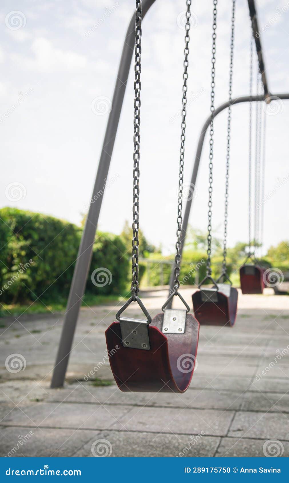 Empty Chain Swing in the Park on a Blurred Background, Close Up. Stock ...