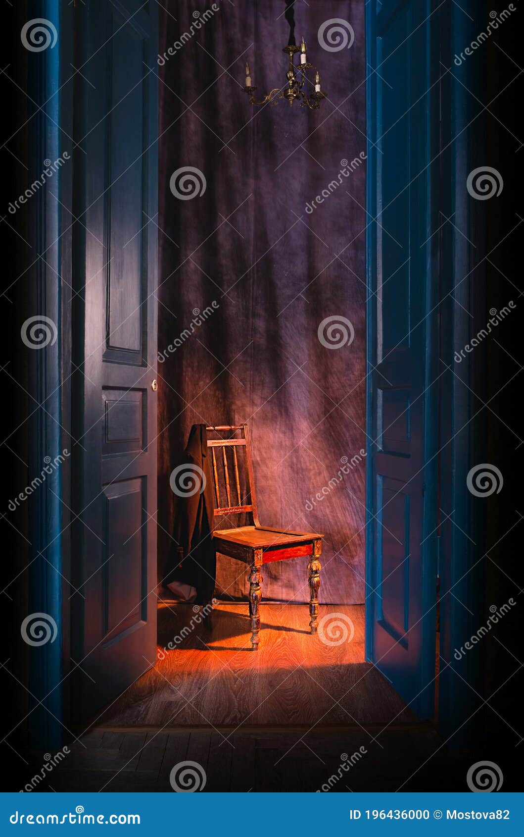Empty Chair in Light Behind Blue Massive Vintage Doors Indoor. Stock ...