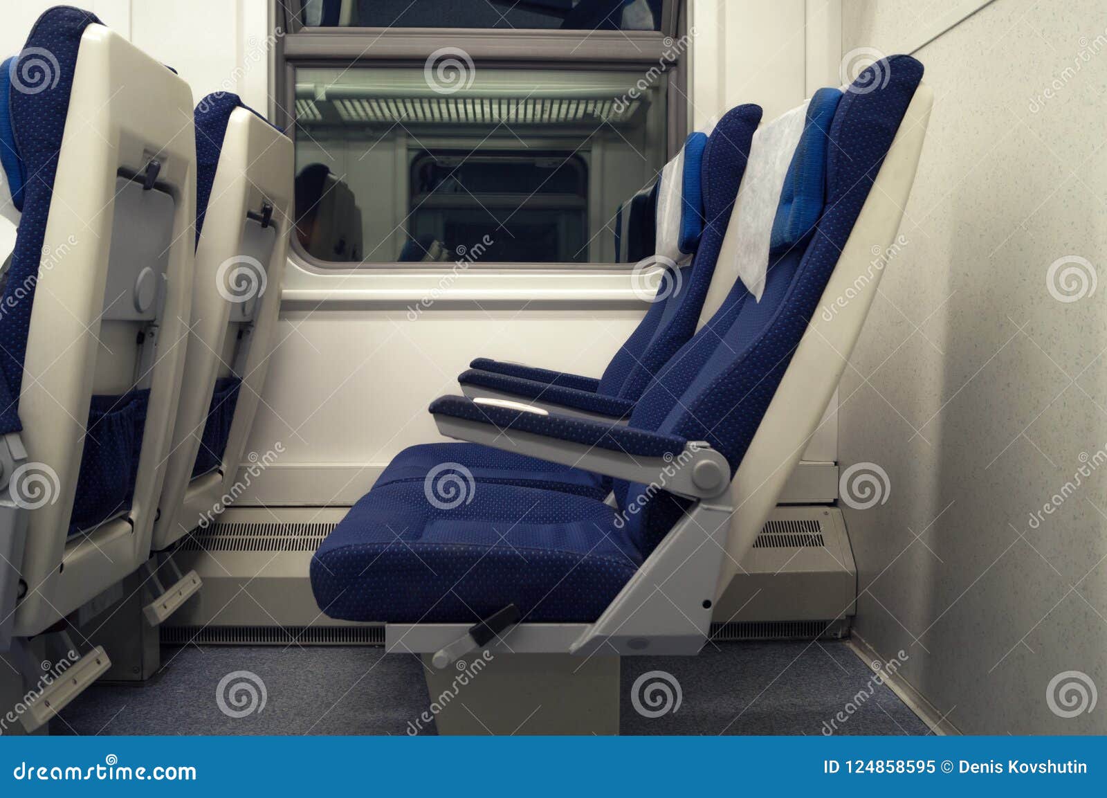 Empty Chairs In The Train Side View. The Interior Of The Railway Wagon ...