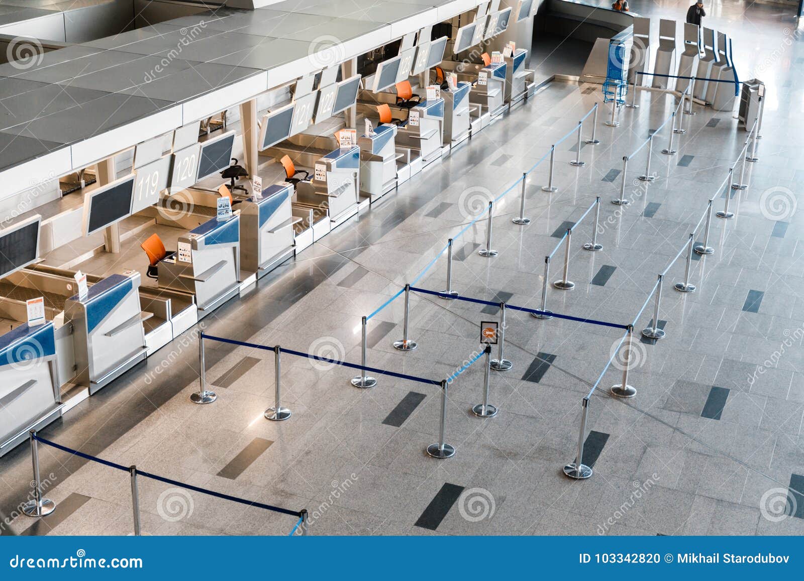 Empty Check-in Desks with Computers and Waiting Lines in Front in ... Empty Check-in Desks with Computers and Waiting Lines in Front in ...
