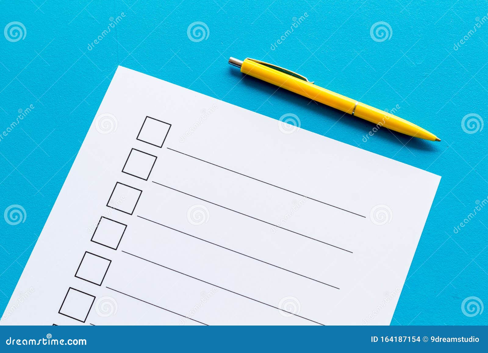 Empty Check List Ready To Fill on Blue Background Top View Stock Photo ...