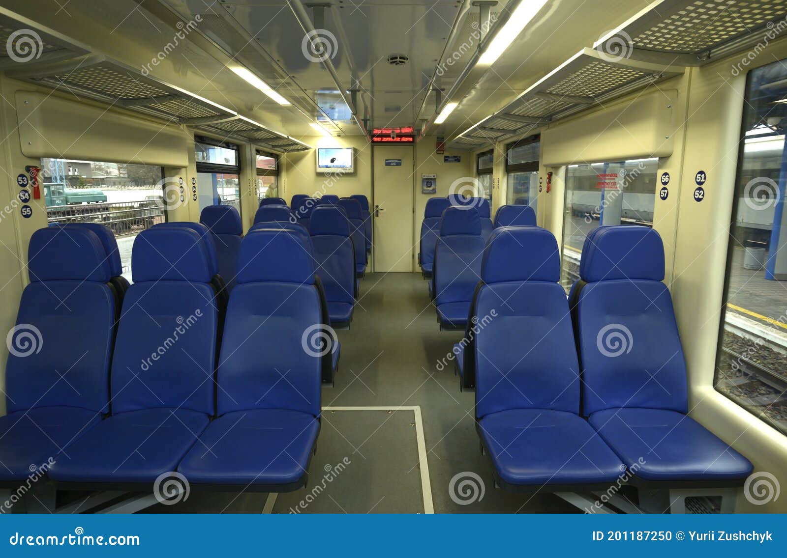 Empty 2 Class Compartment of Wagon of Commuter Train, Seats and Doors ...
