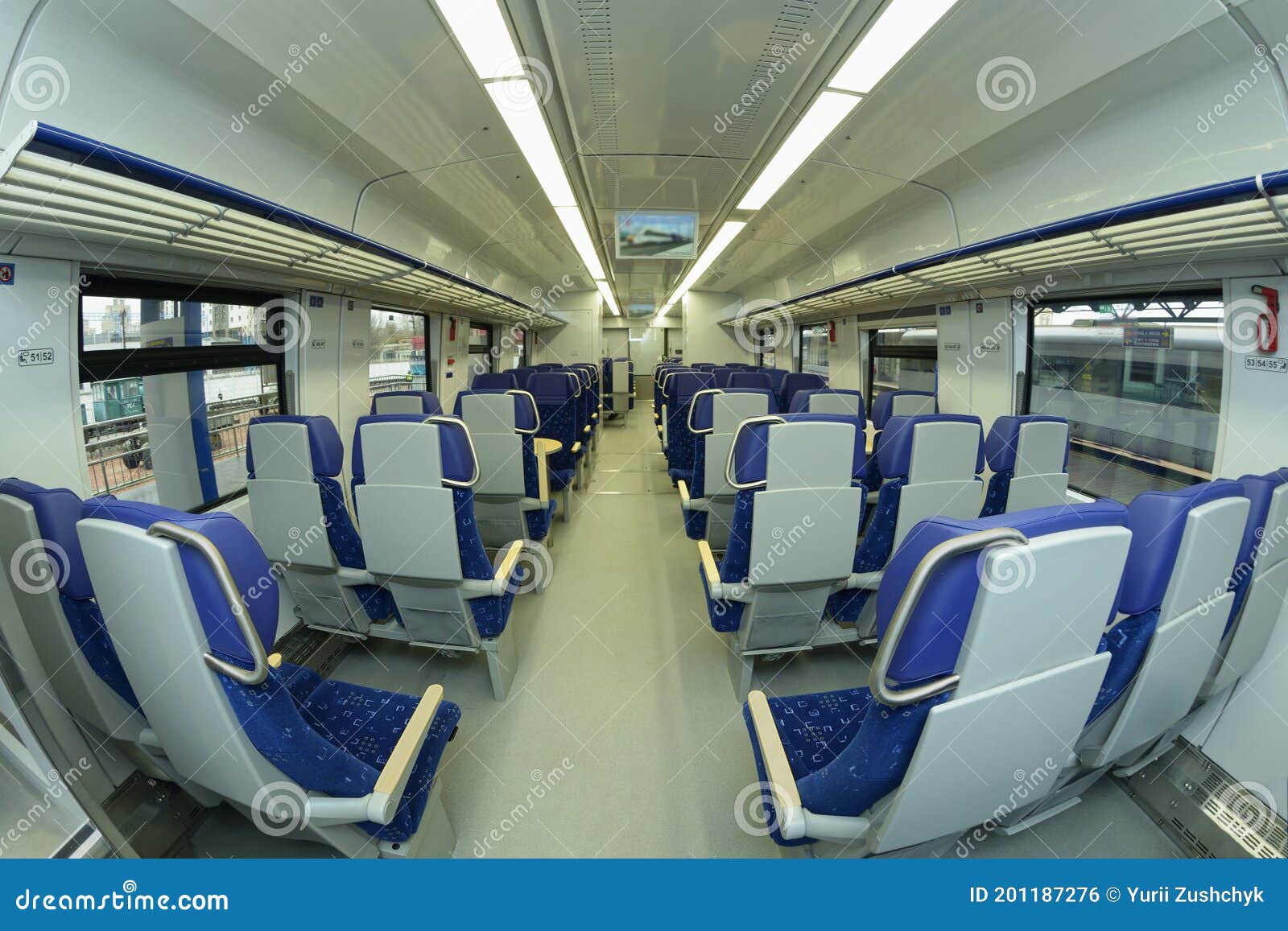 Empty 2 Class Compartment of Wagon of Commuter Train, Seats and Doors ...