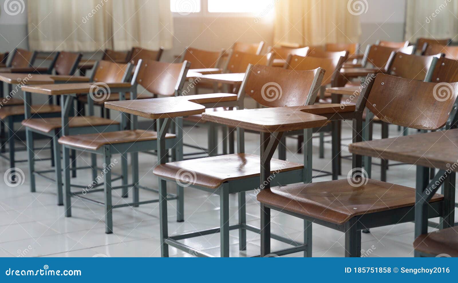 An Empty Classroom with Wooden Chairs No Student. Back To School ...