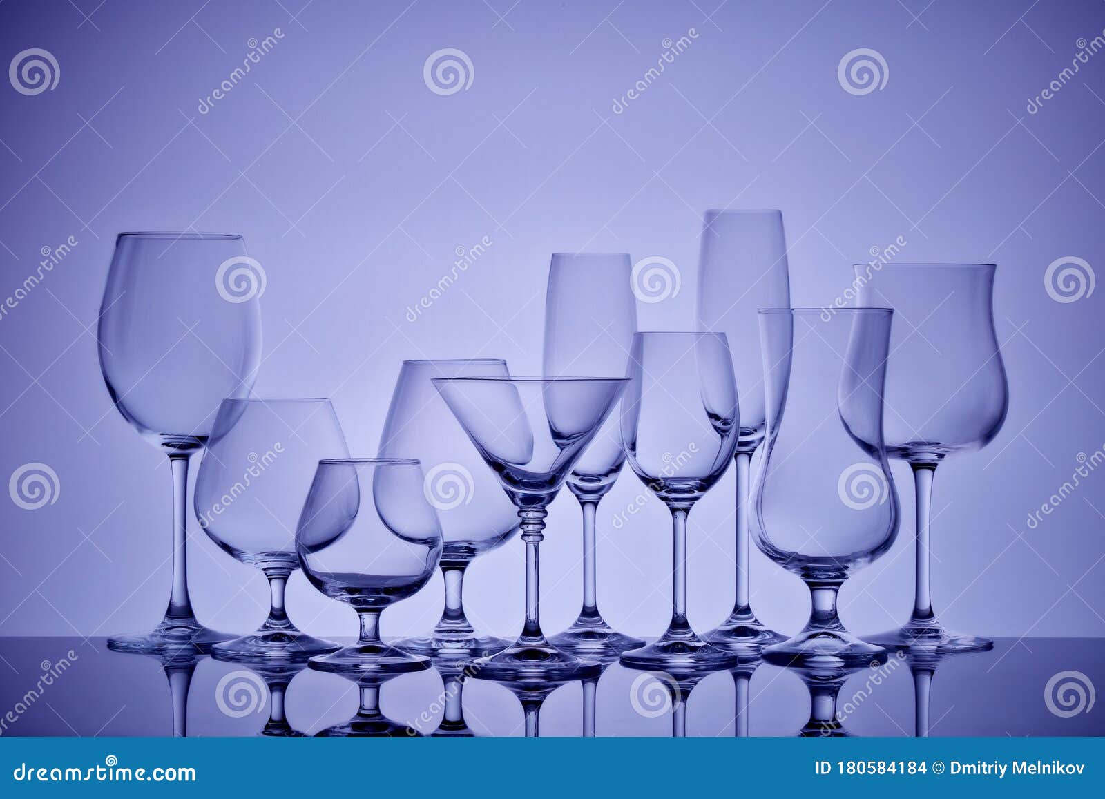 Empty Clear Glassware Set Of Glasses For Different Alcoholic Drinks And Cocktails On Light