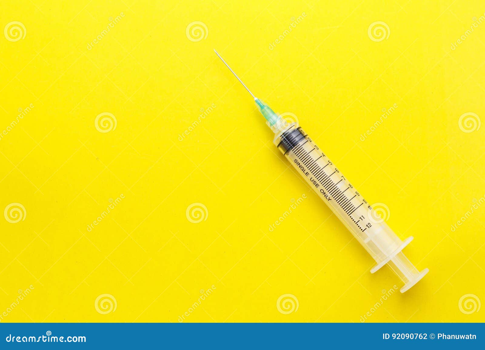Empty Clear Syringe with Needle on Yellow Background Stock Photo ...