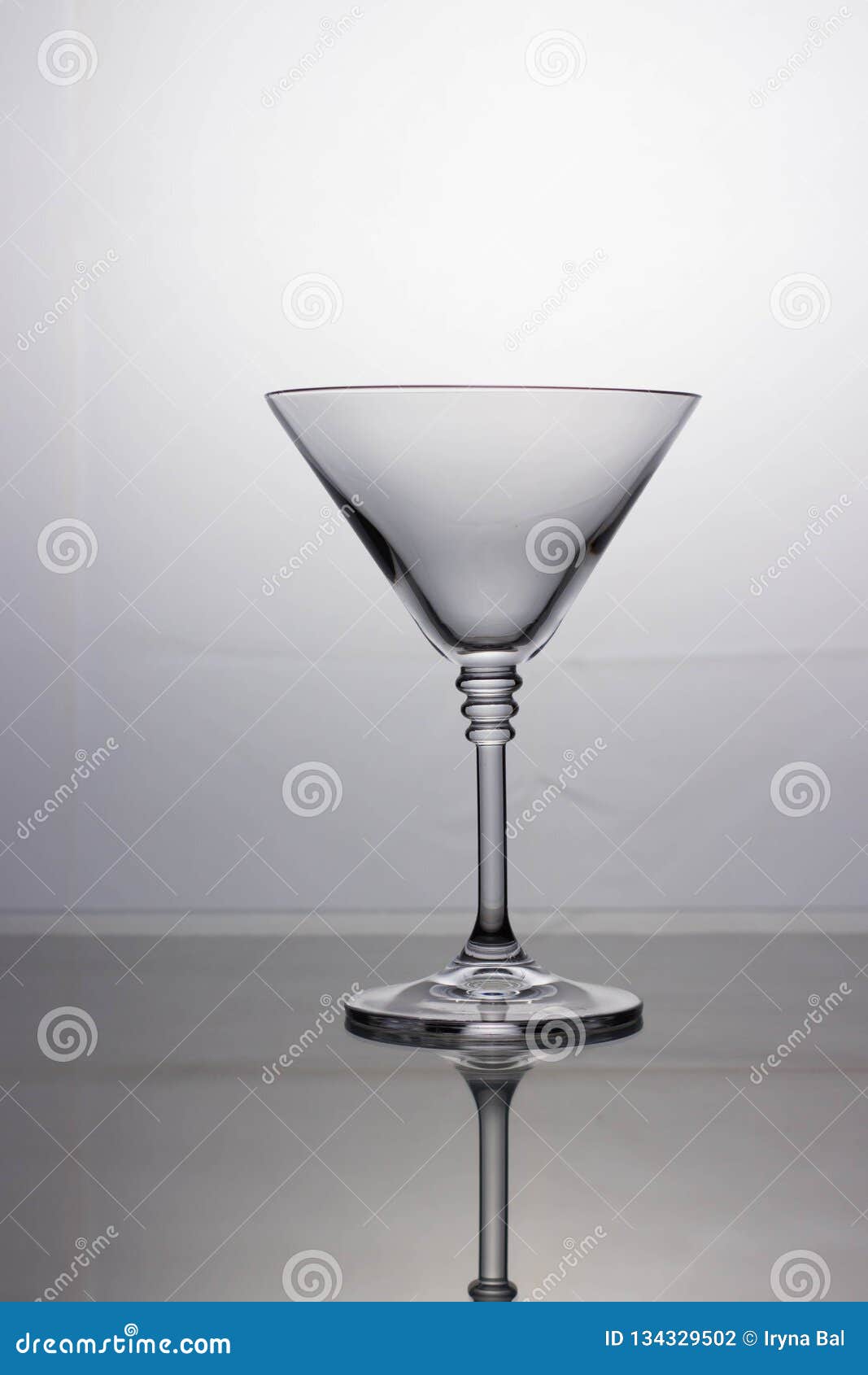 Empty Transparent Cocktail Glass on a Light Background Stock Photo ...