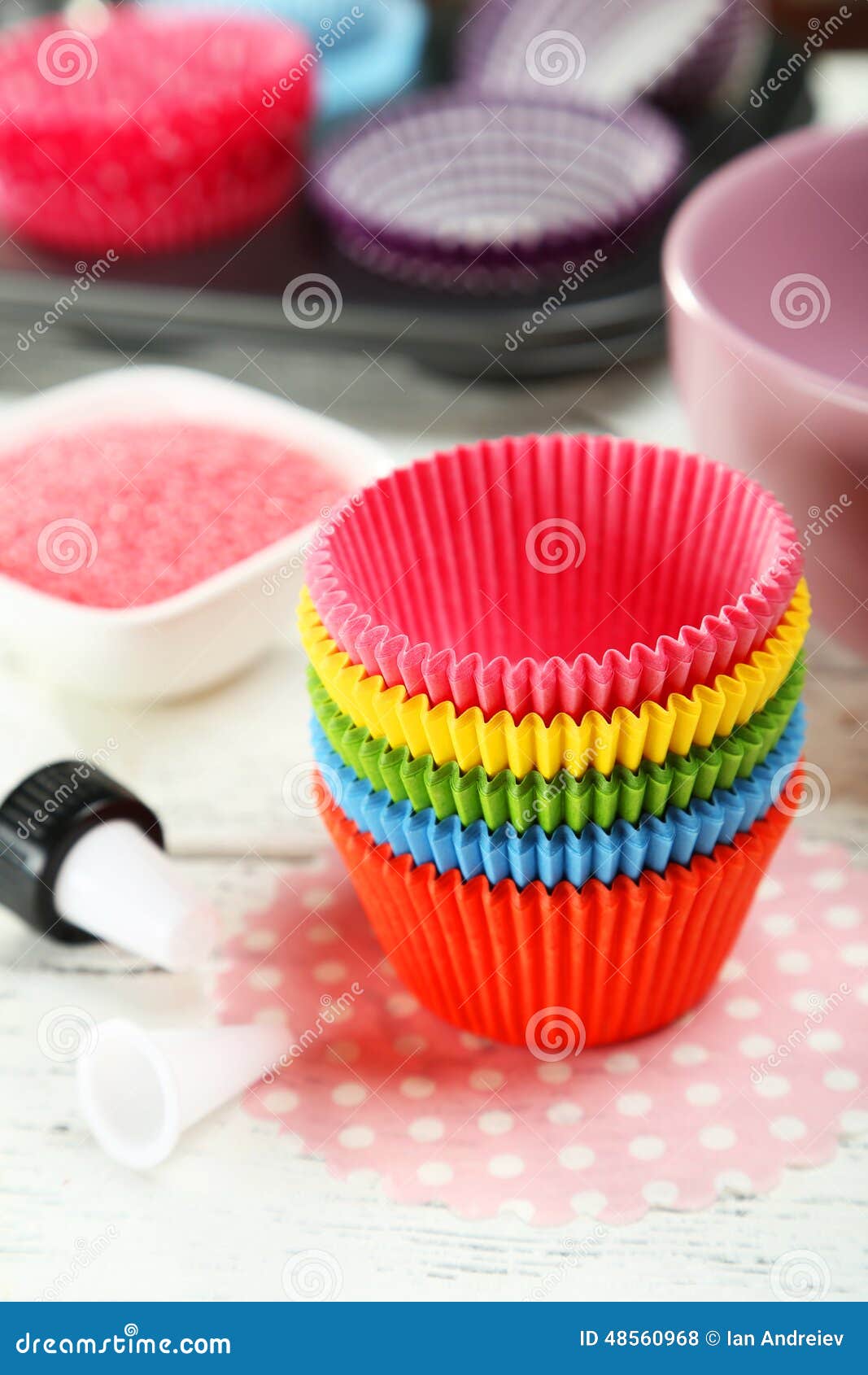Empty Colorful Cupcake Cases on the White Wooden Background Stock Photo ...