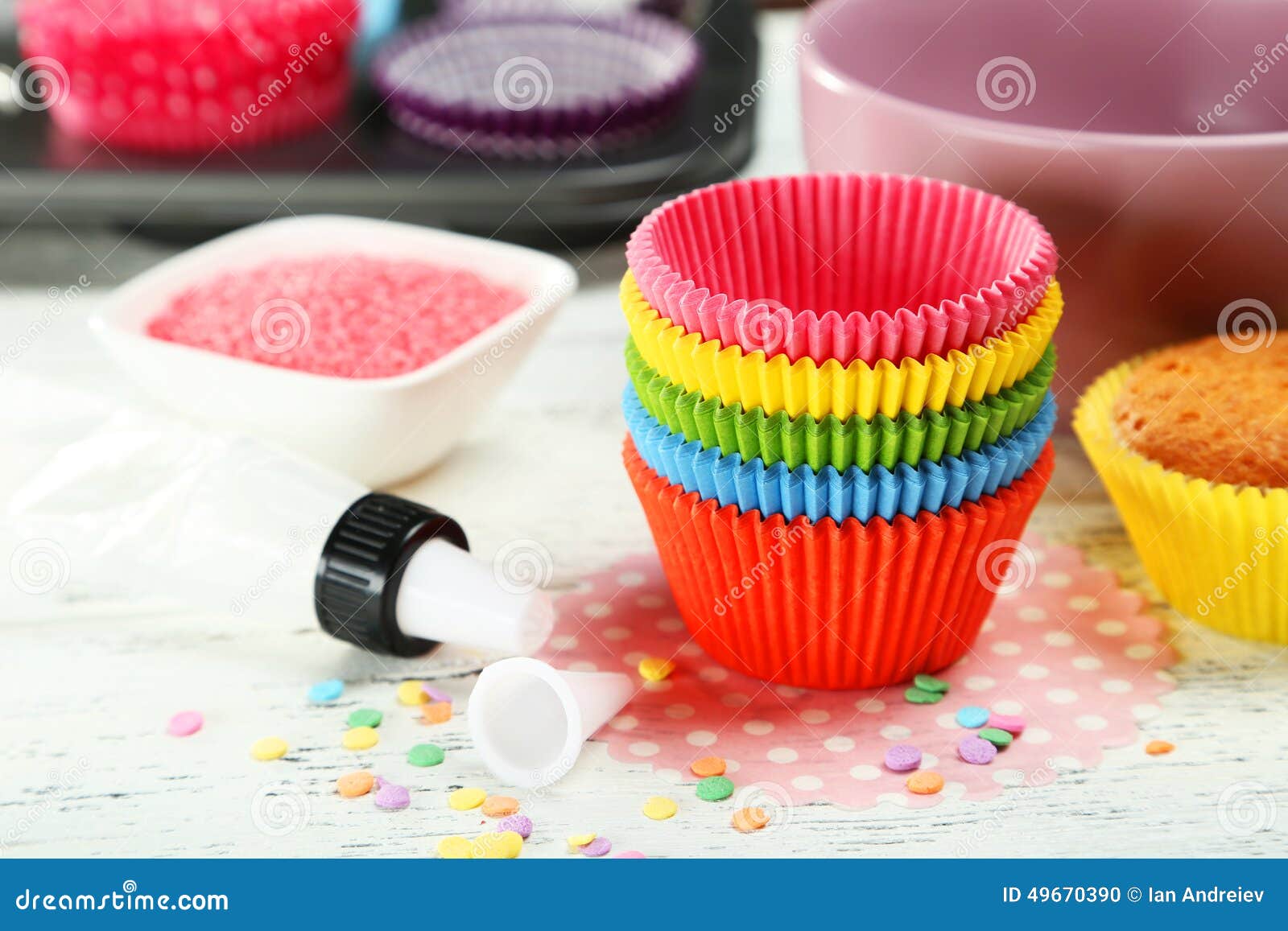 Empty Colorful Cupcake Cases on the White Wooden Background Stock Photo ...