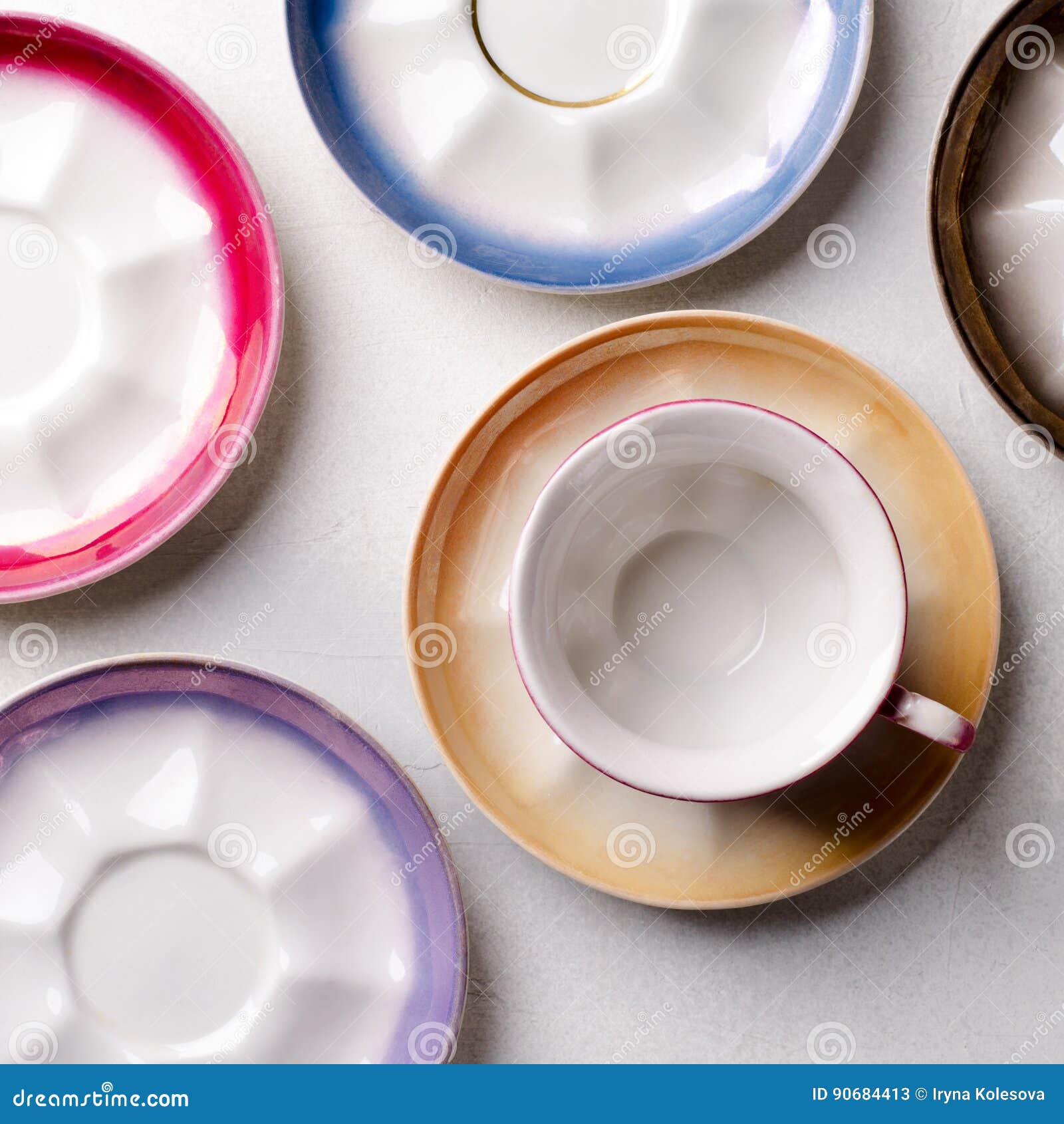 Empty Colorful Porcelain Tableware, Cups and Plates on Grey Background ...