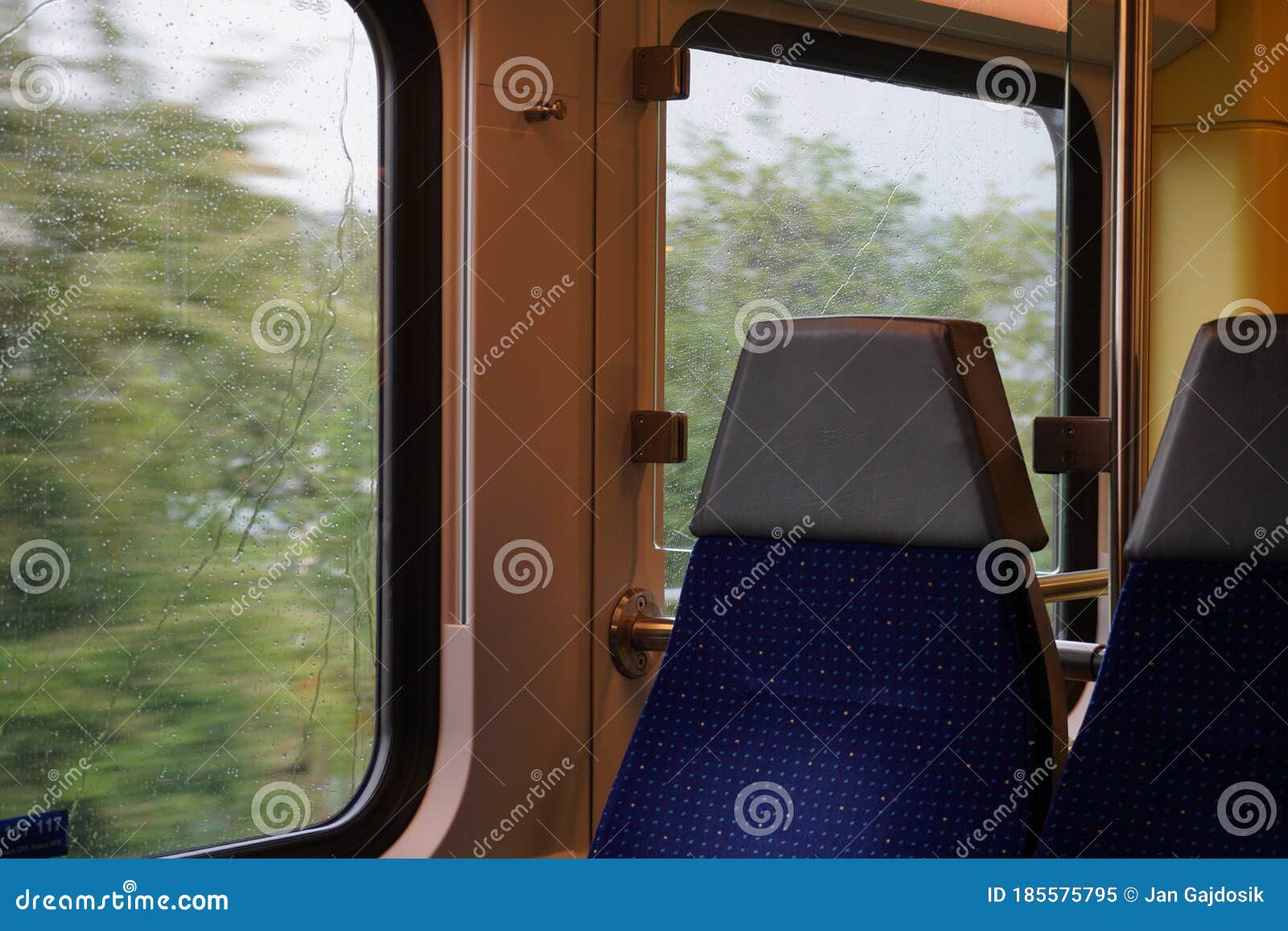 Empty Commuter Train on a Rainy Day, the Windows are Covered by ...