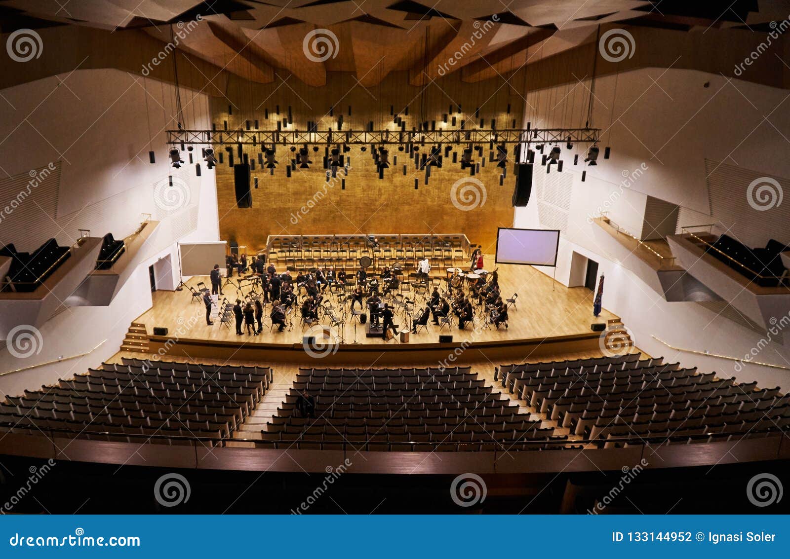 Empty Concert Hall with Some Musicians Practicing Stock Photo - Image ...