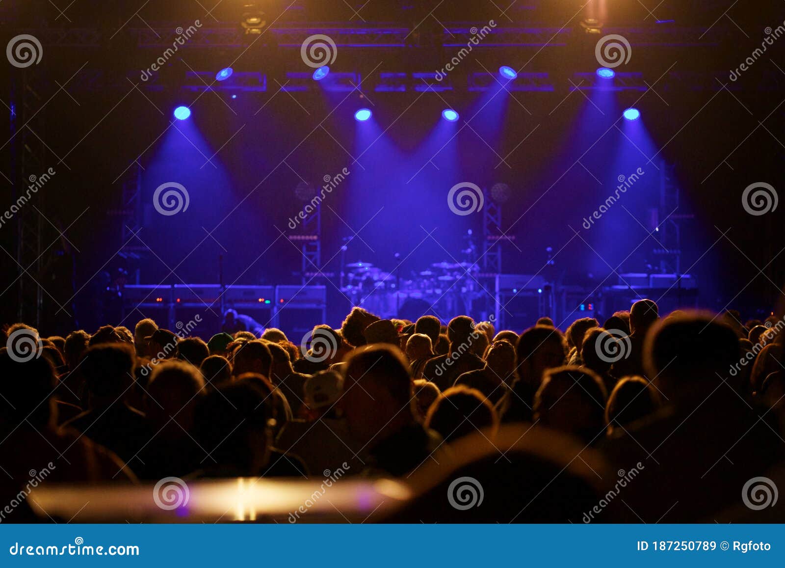 Empty Concert Stage with Crowd in Front Blue Stage Lights Stock Image ...
