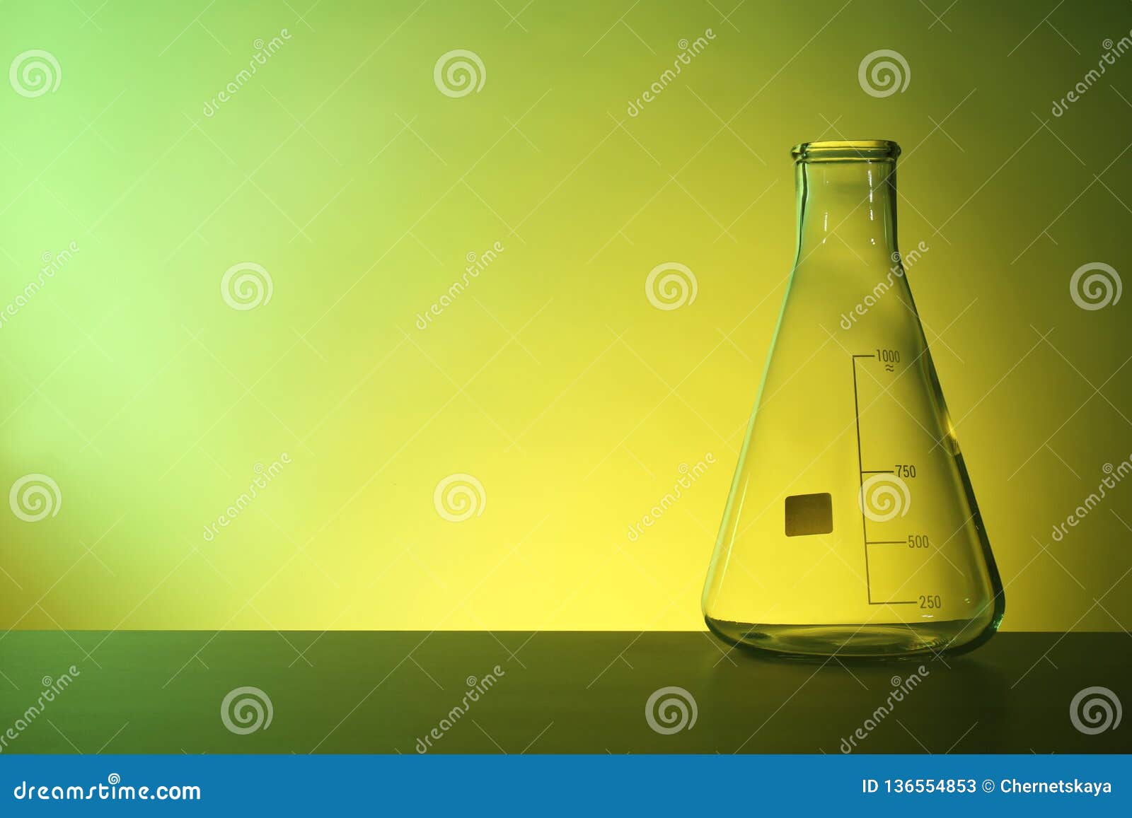 Empty Conical Flask on Table Against Color Background. Stock Image ...
