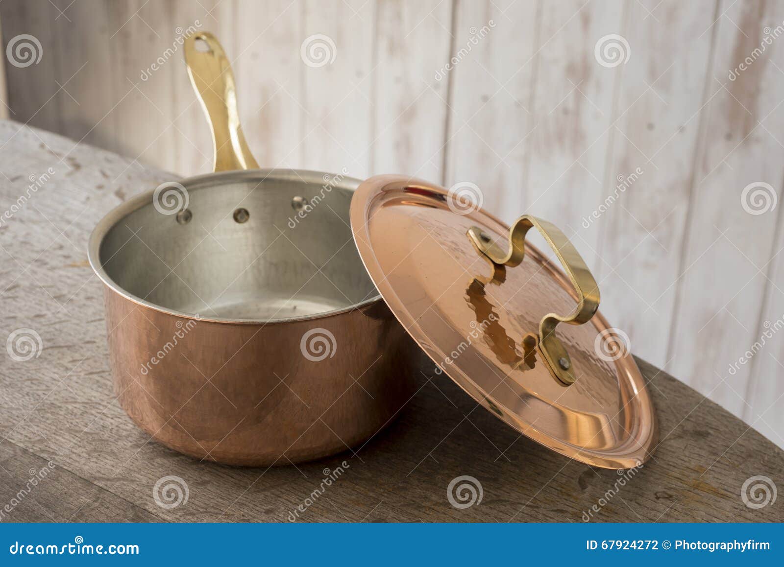 An Empty Copper Saucepan Alongside Lid Stock Photo - Image of empty ...