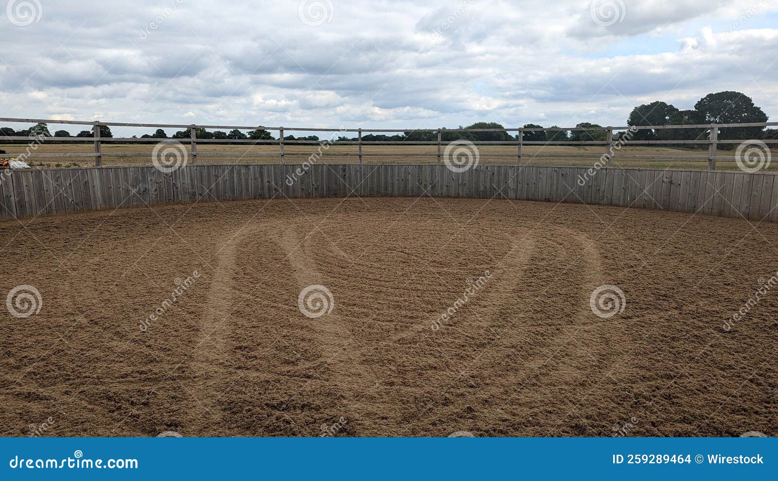 Empty Corral with Round Wooden Fence in the Field Stock Photo - Image ...