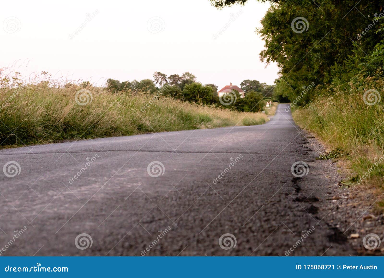 An Empty Countryside Road Stretching into the Distance Stock Image ...