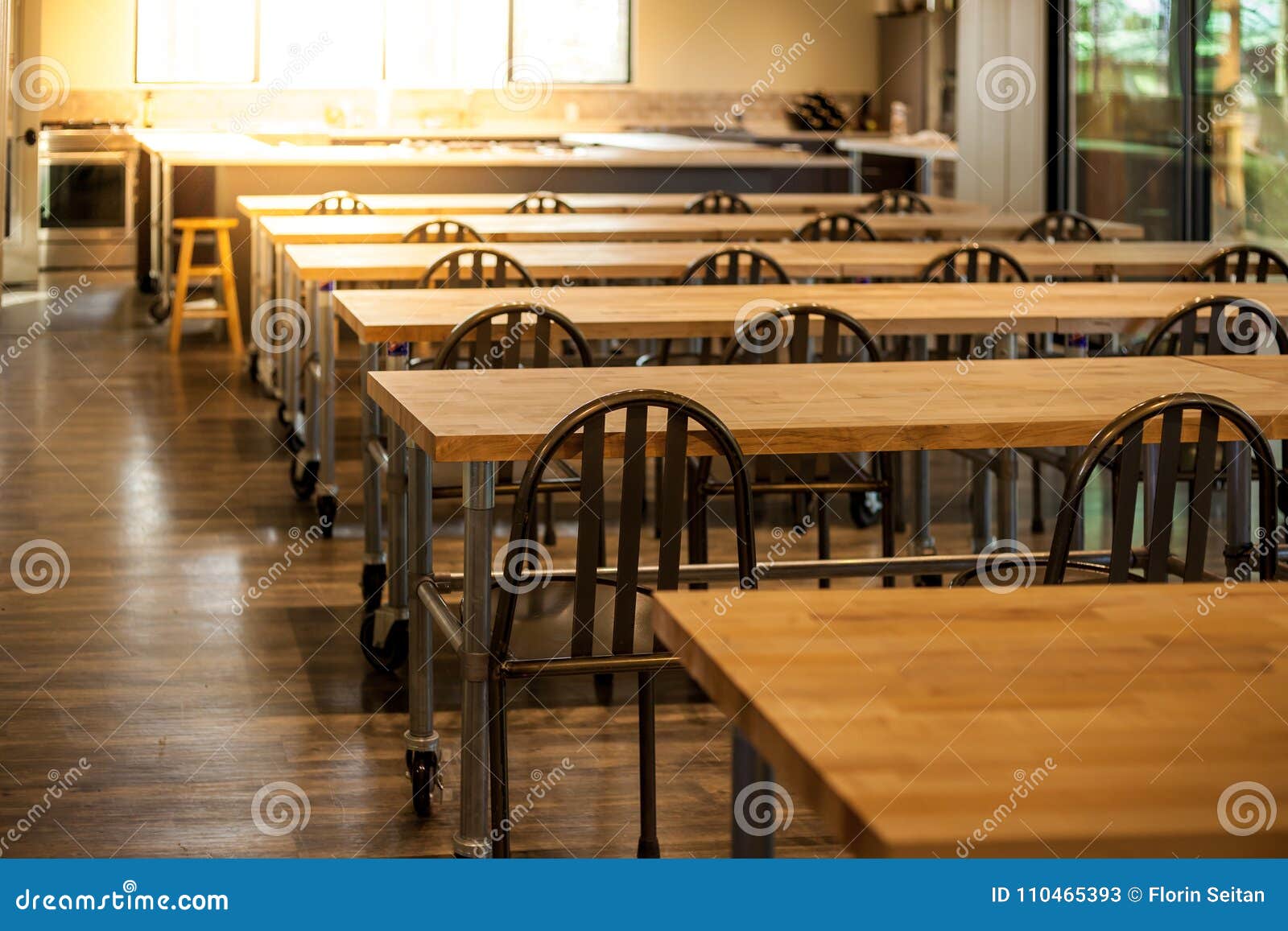 Empty Culinary School Classroom with Rows of Tables and Chairs Stock ...