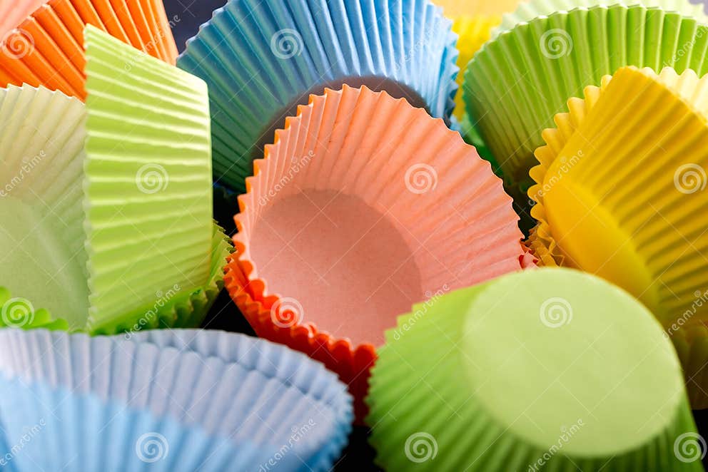 Empty Cupcake Cases, Forms on Blue Background, Table Stock Image ...