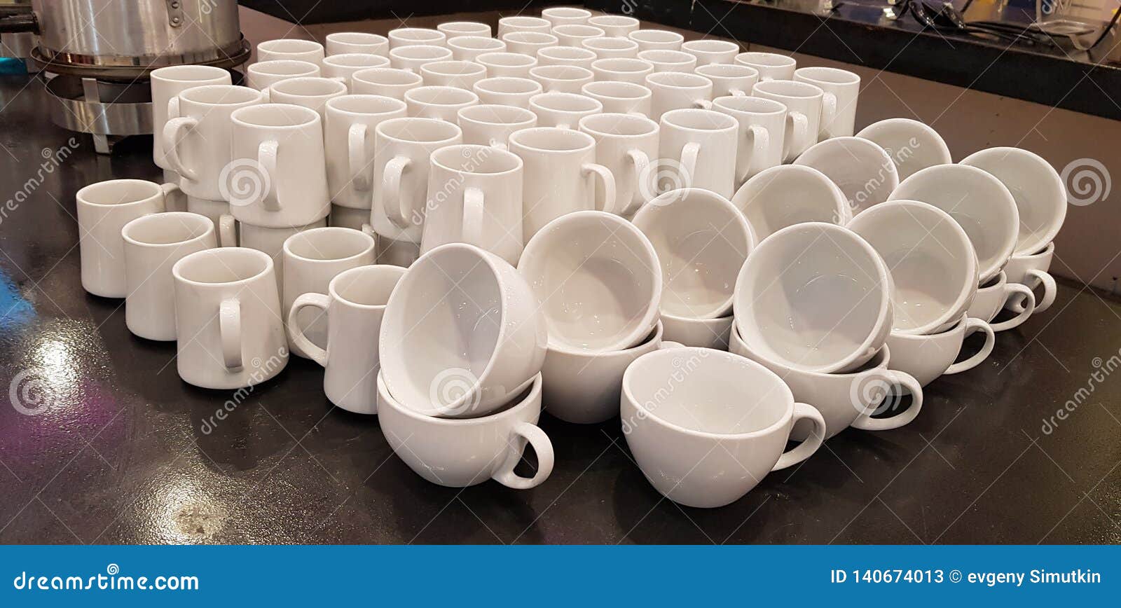 Empty White Cups and Mugs Stacked in Rows on the Table Stock Image ...