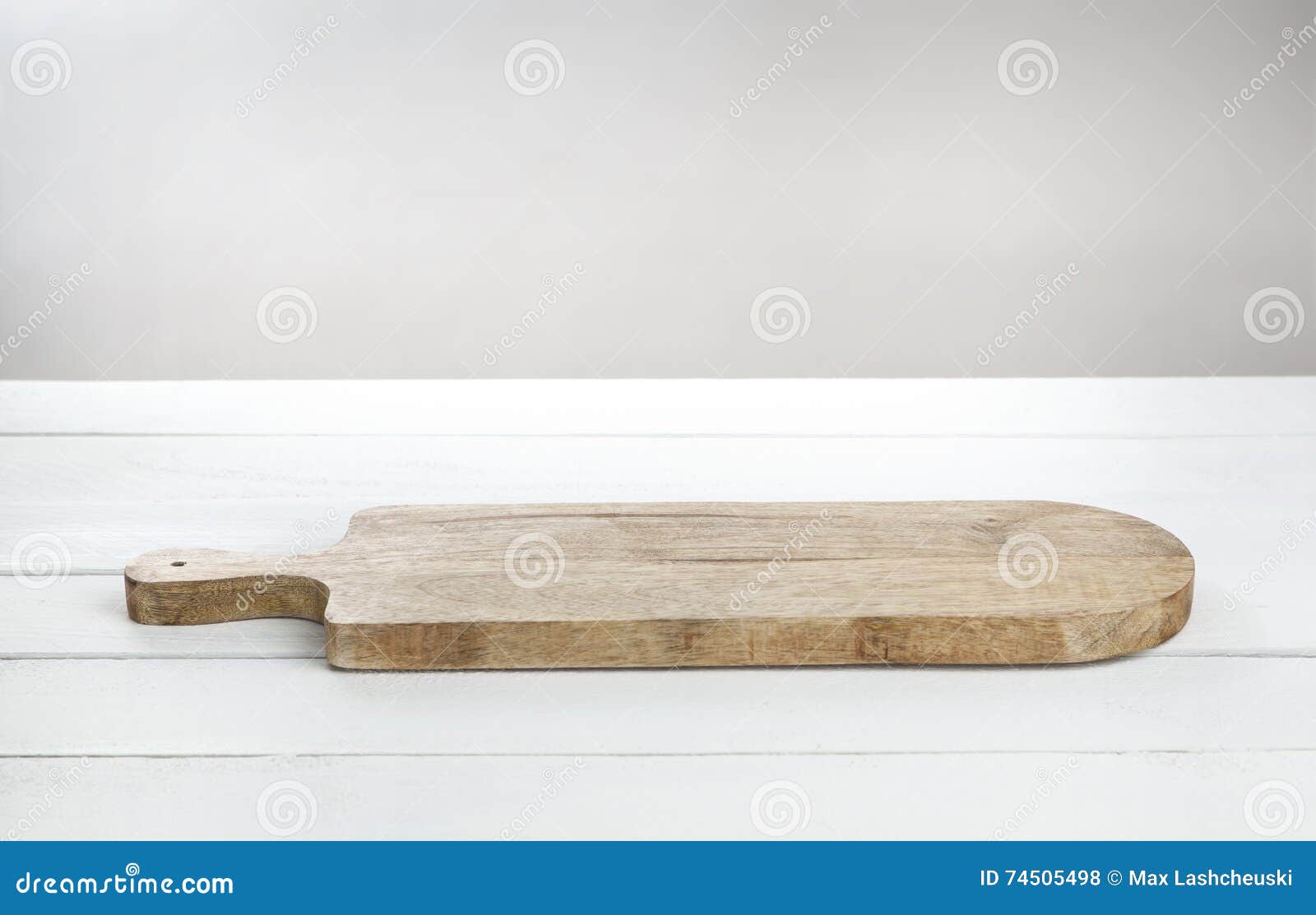 Empty Cutting Board for Cheese on White Wooden Table. Stock Photo ...