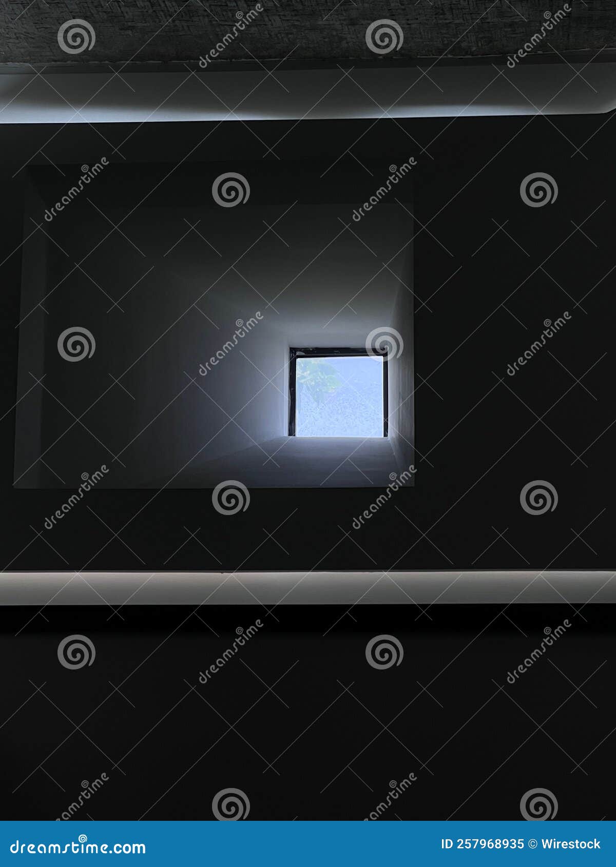 Empty Dark Room with a Skylight Shining through the Window Stock Image ...