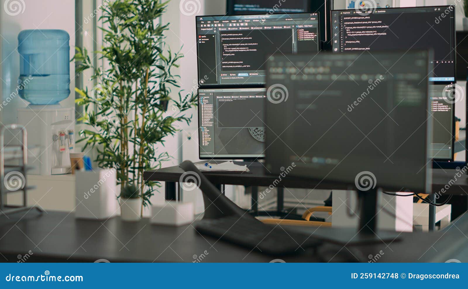 Empty Desk with Multiple Monitors Displaying Server Code and Programming Language Stock Photo ...