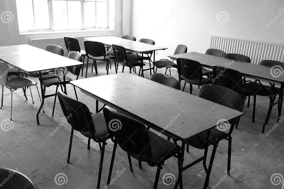 An Empty Desolate Classroom with Empty Desk and Seats Stock Photo ...