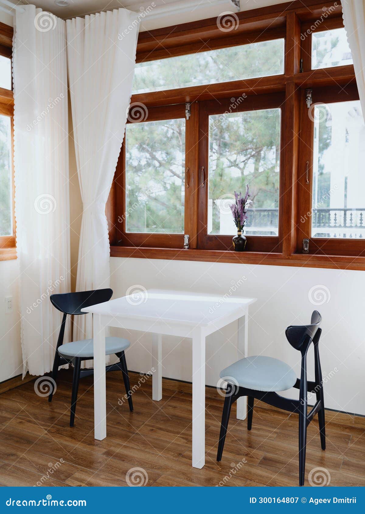 Empty Dining Table with Chairs in Light Interior by Window, Cozy Design ...