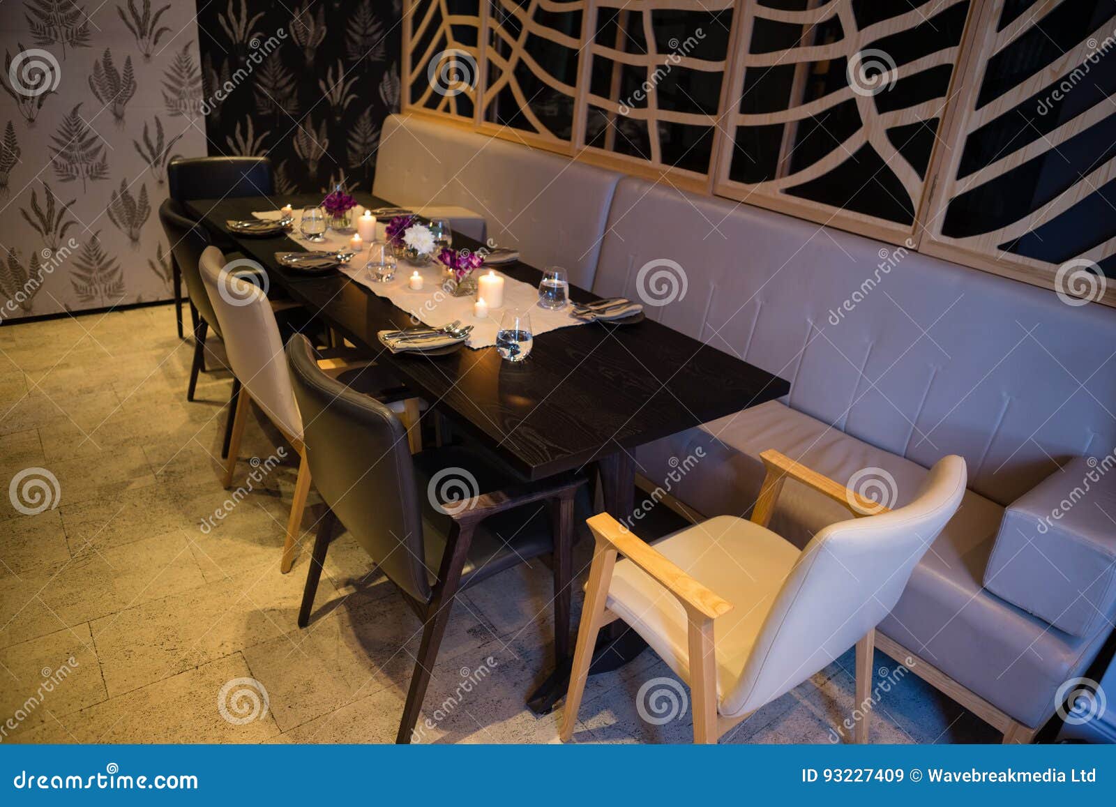Empty Dining Table in Illuminated Restaurant Stock Image - Image of ...