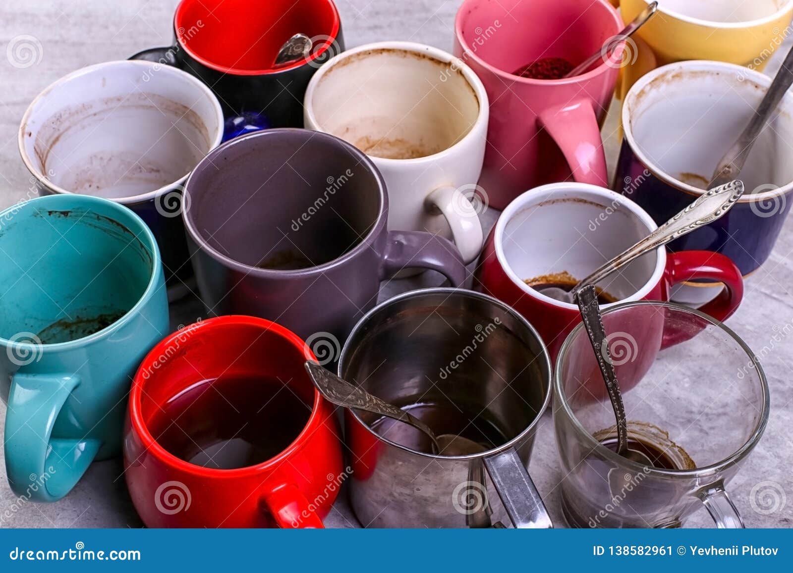 Empty Dirty Coffee Cups of Different Colors on the Table. Concept of ...