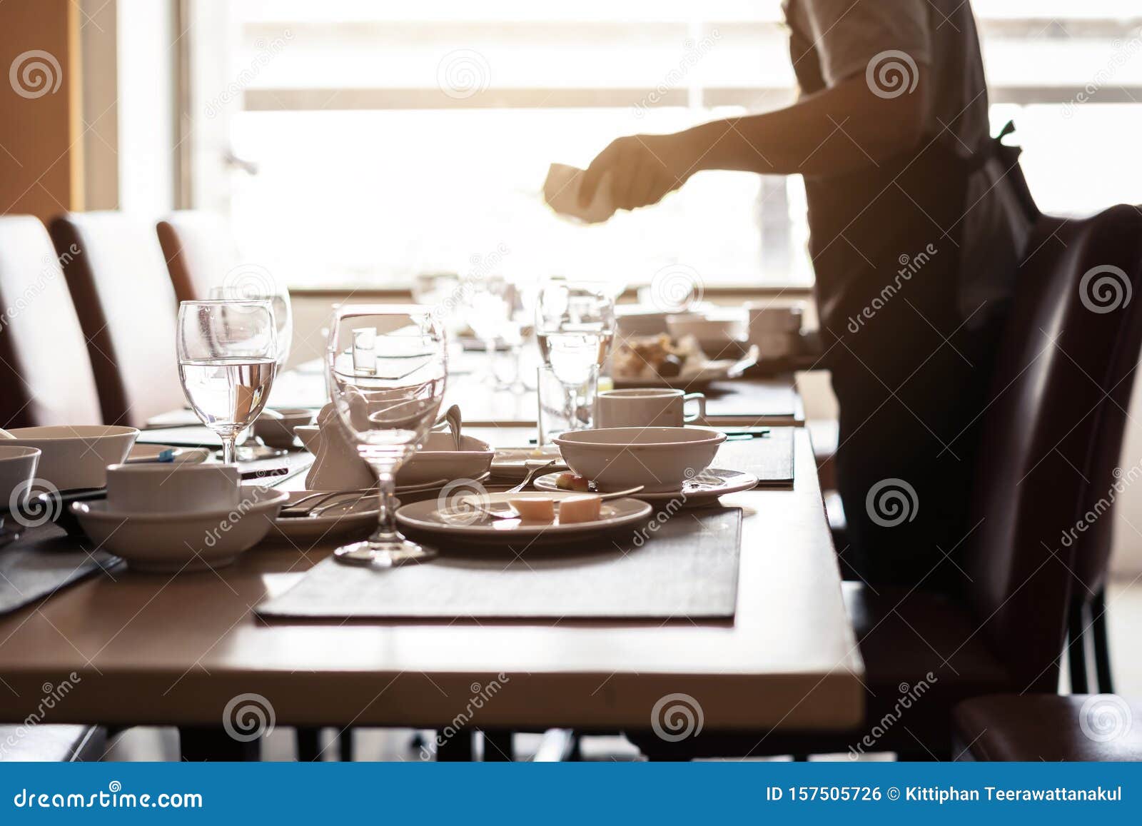 Person Clearing The Table