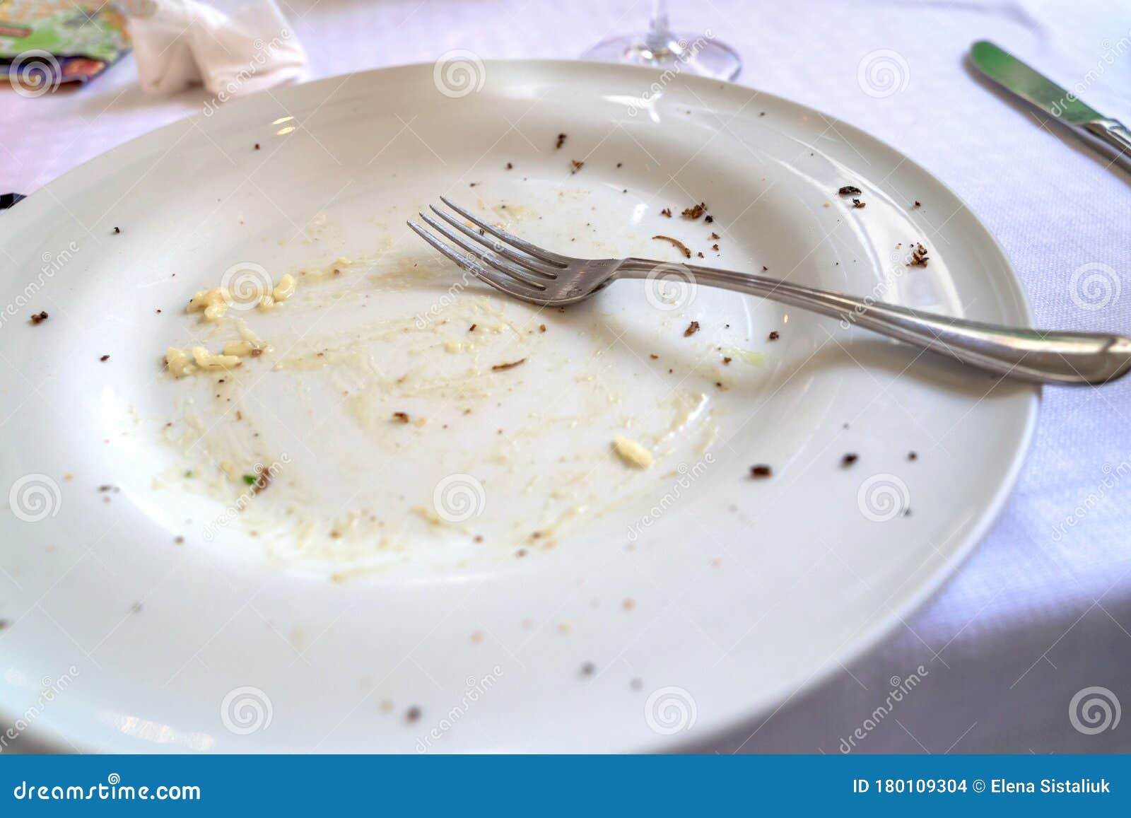 Empty Dirty Plate with Crumbs and a Fork on it Stock Photo - Image of ...