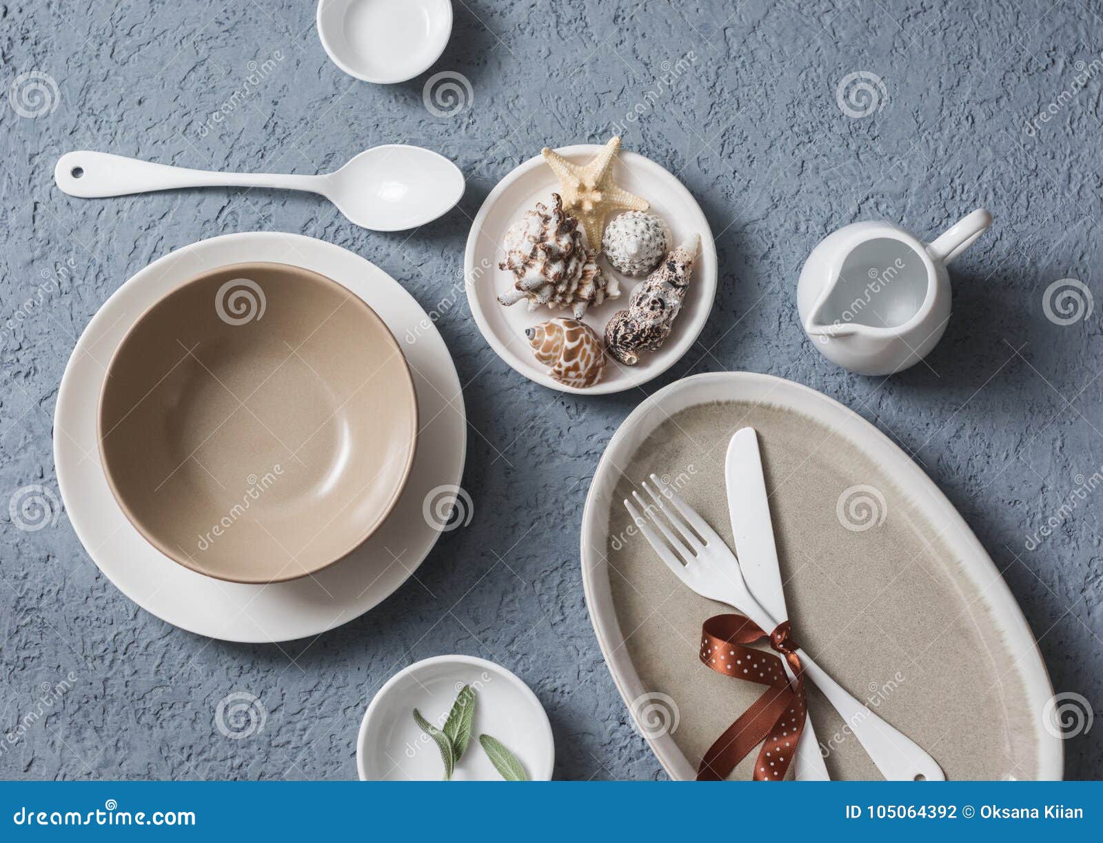 Empty Dishes Serving Lunch Table on Grey Background, Top View Stock ...