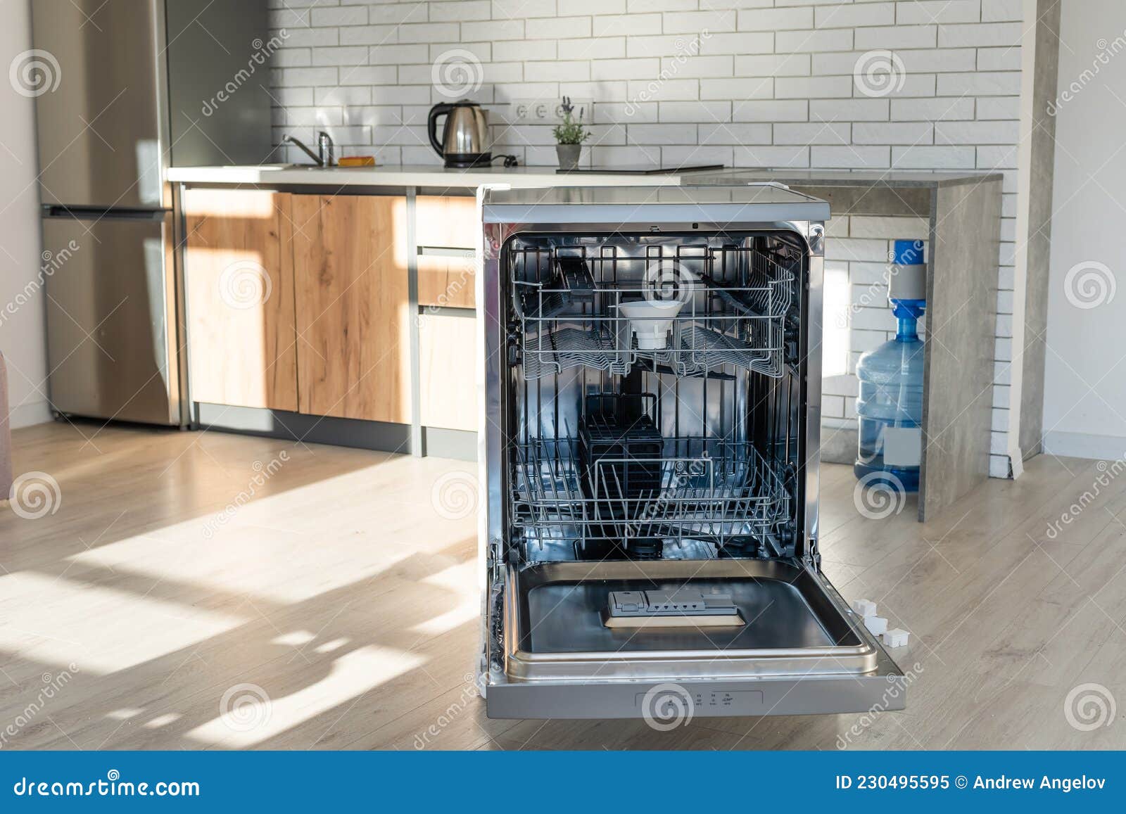 An Empty Dishwasher, Opened, in the Modern Kitchen of a Home. Stock ...